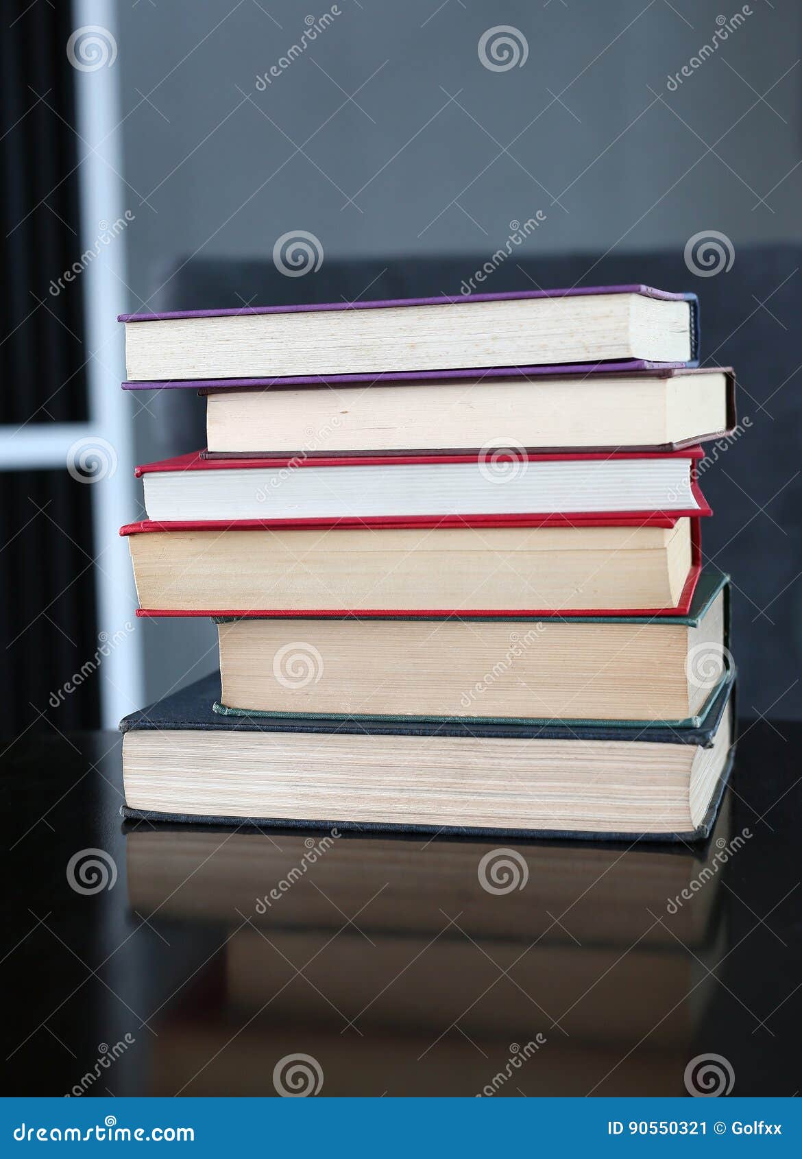 Stack of Hardback Books on Wooden Table. Stock Image - Image of ...