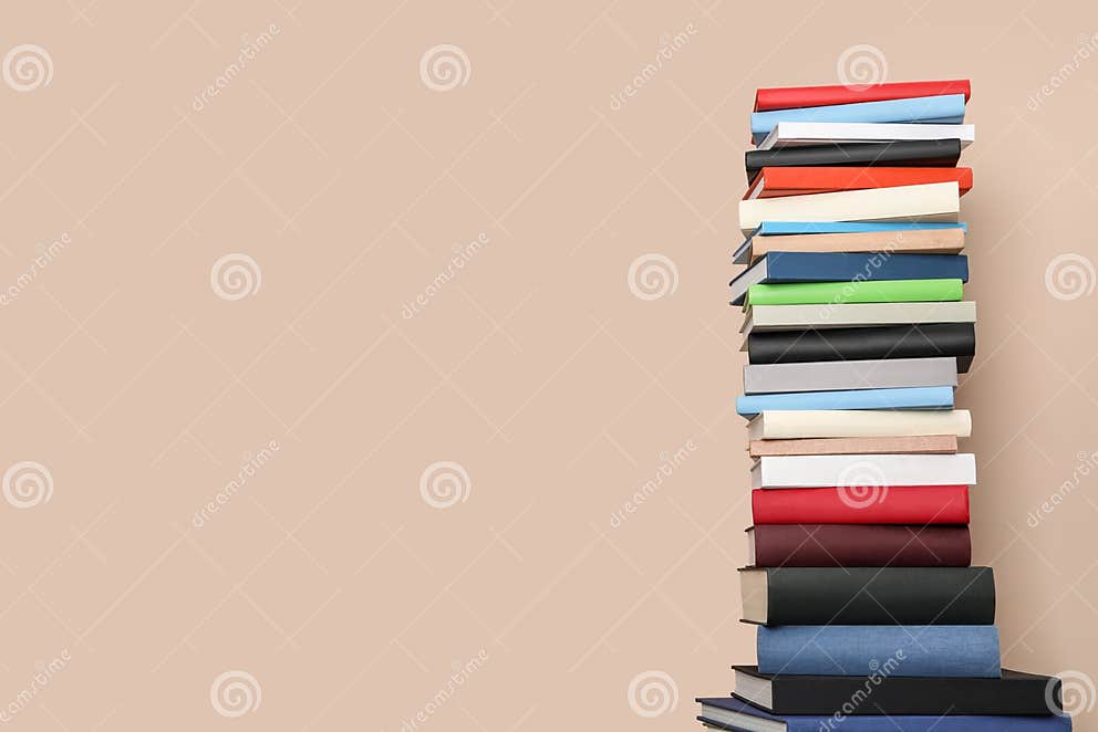 Stack of Hardcover Books on Beige Background. Space for Text Stock ...