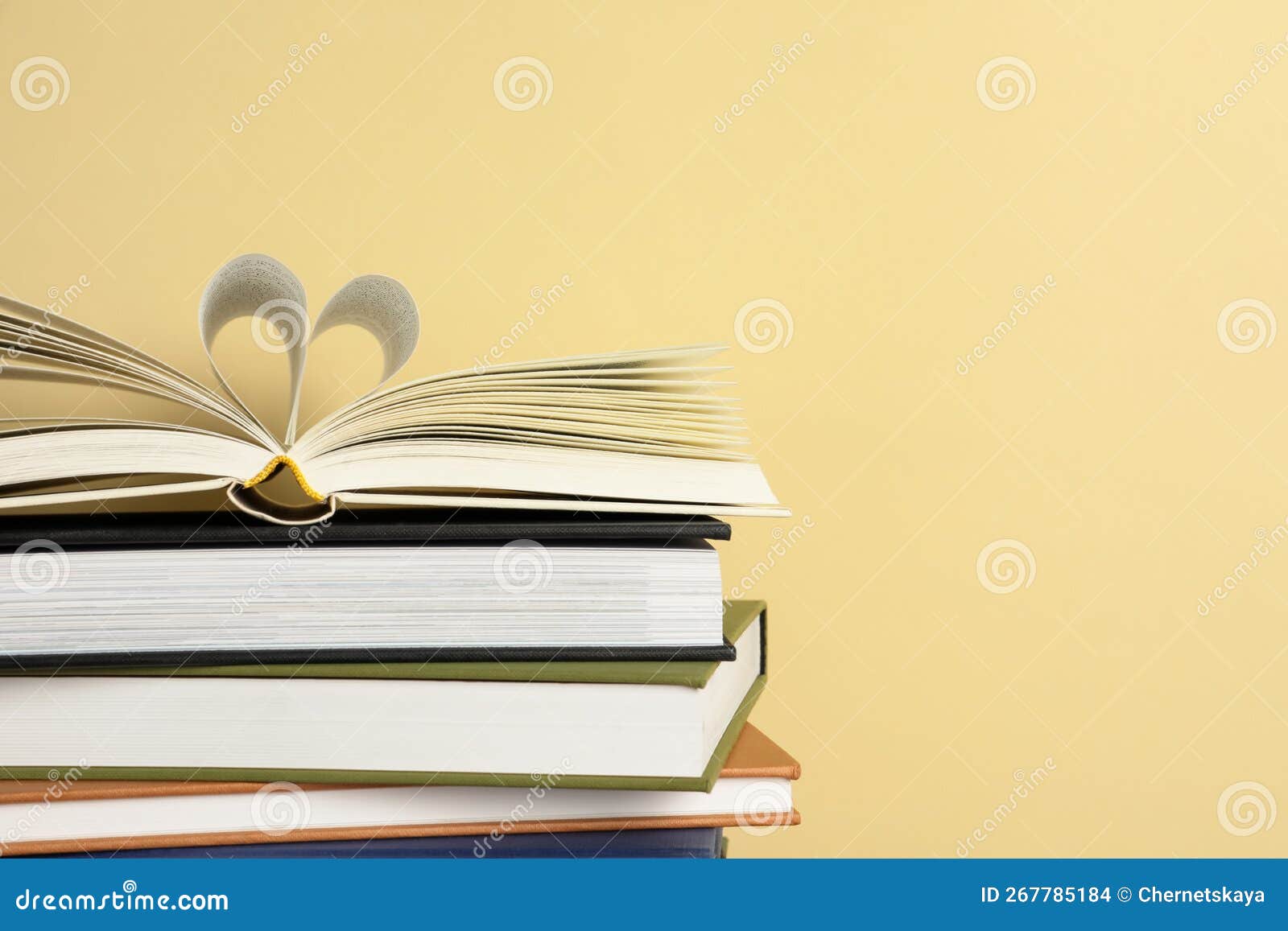 Stack of Hardcover Books on Yellow Background, Space for Text Stock ...