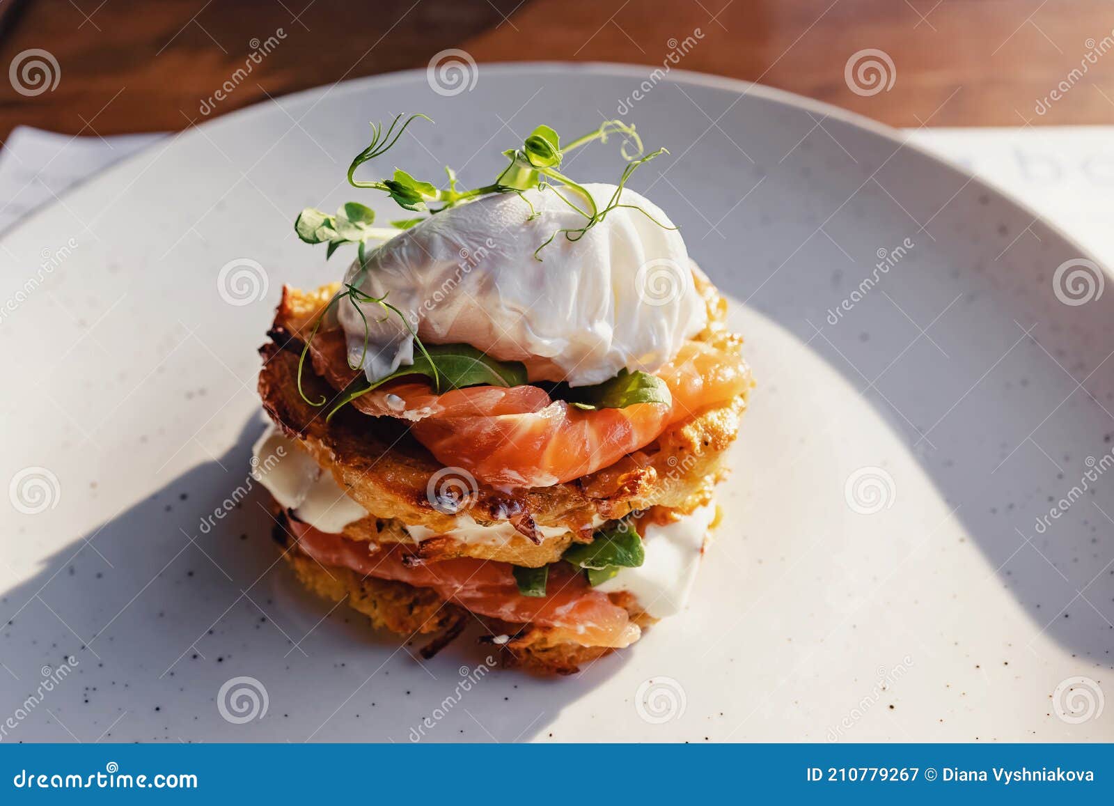 Stack of Hash Brown with Salmon and Poached Egg on the Top. Stock Image ...
