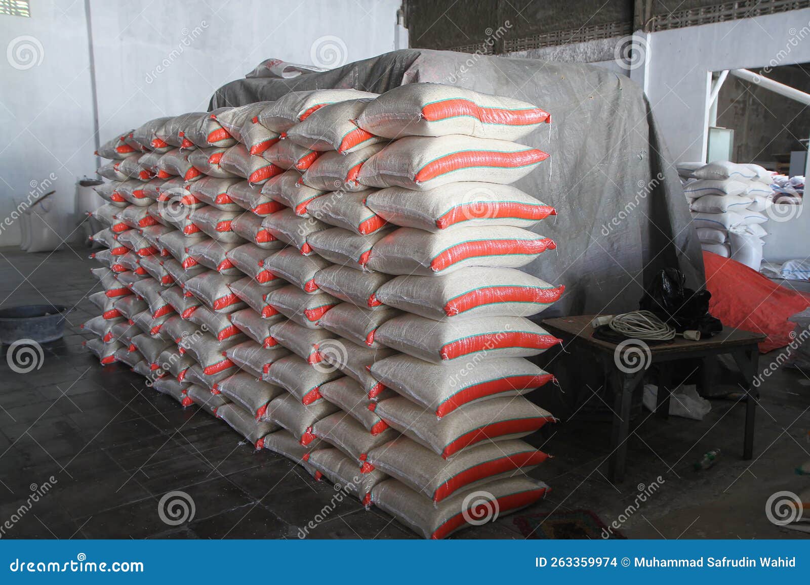 Stack hemp sacks of rice stock photo. Image of heap - 263359974