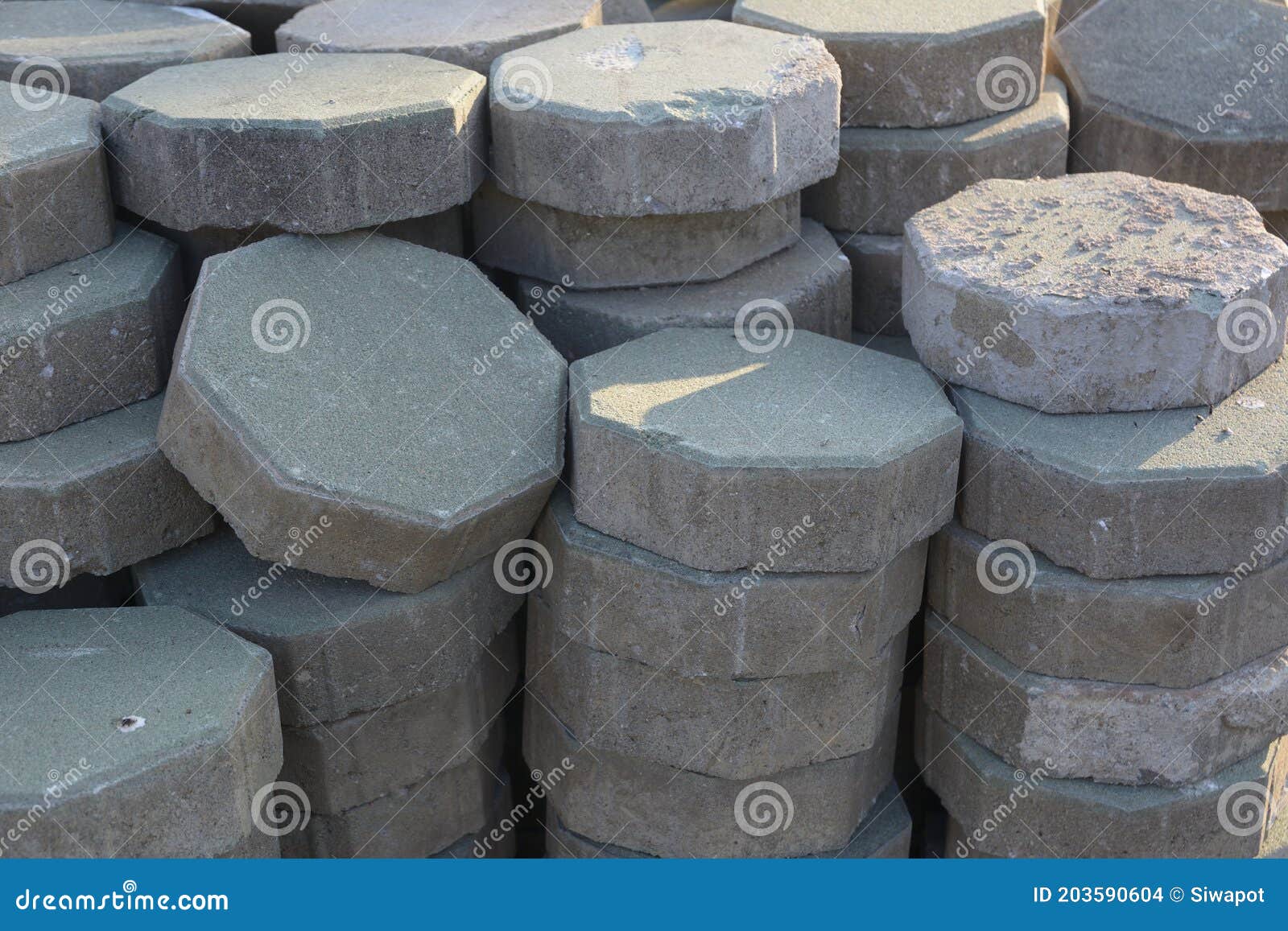 Stack of Hexagonal Concrete Paving with Sunshine. Stock Photo - Image ...