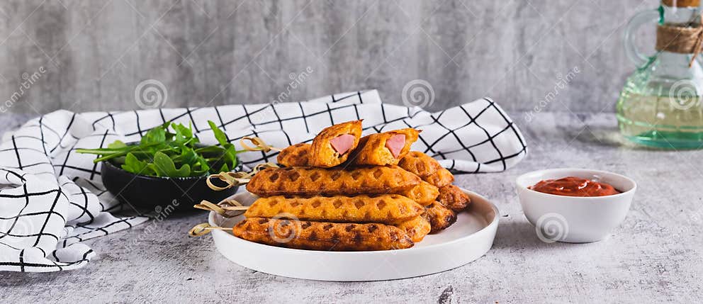 Stack of Homemade Corn Dogs with Sausage on a Plate on a Table Web ...