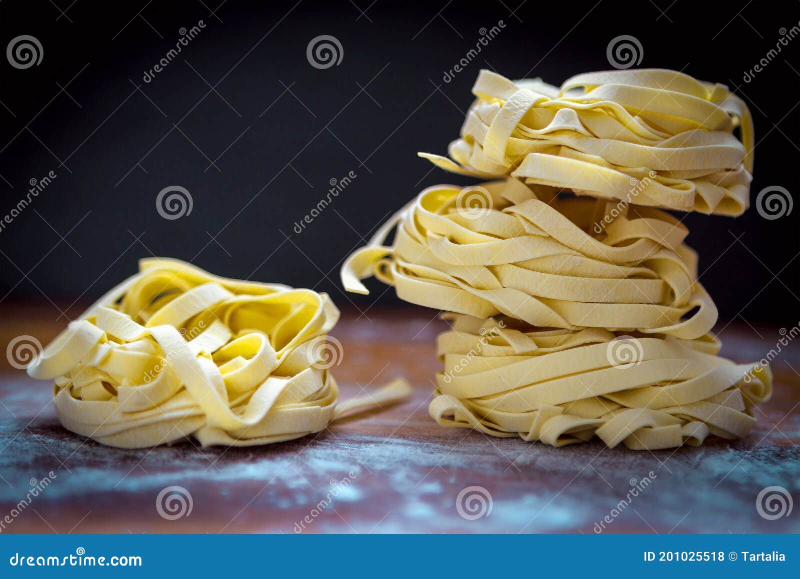 Stack of Homemade Nest-shaped Pasta on Wooden Table Stock Photo - Image ...