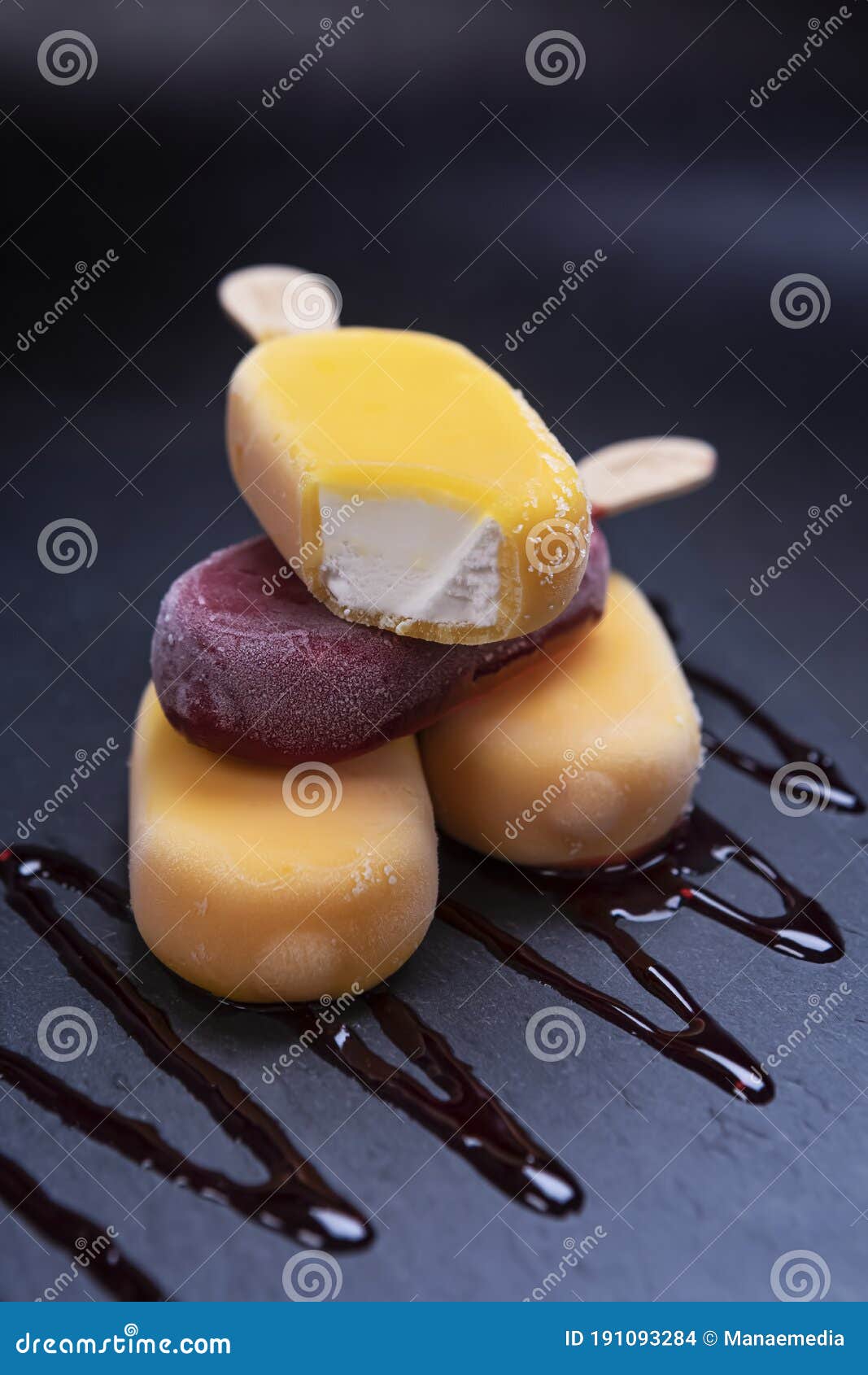 Stack of Ice Cream Stick Placed on a Black Stone Background Stock Photo ...