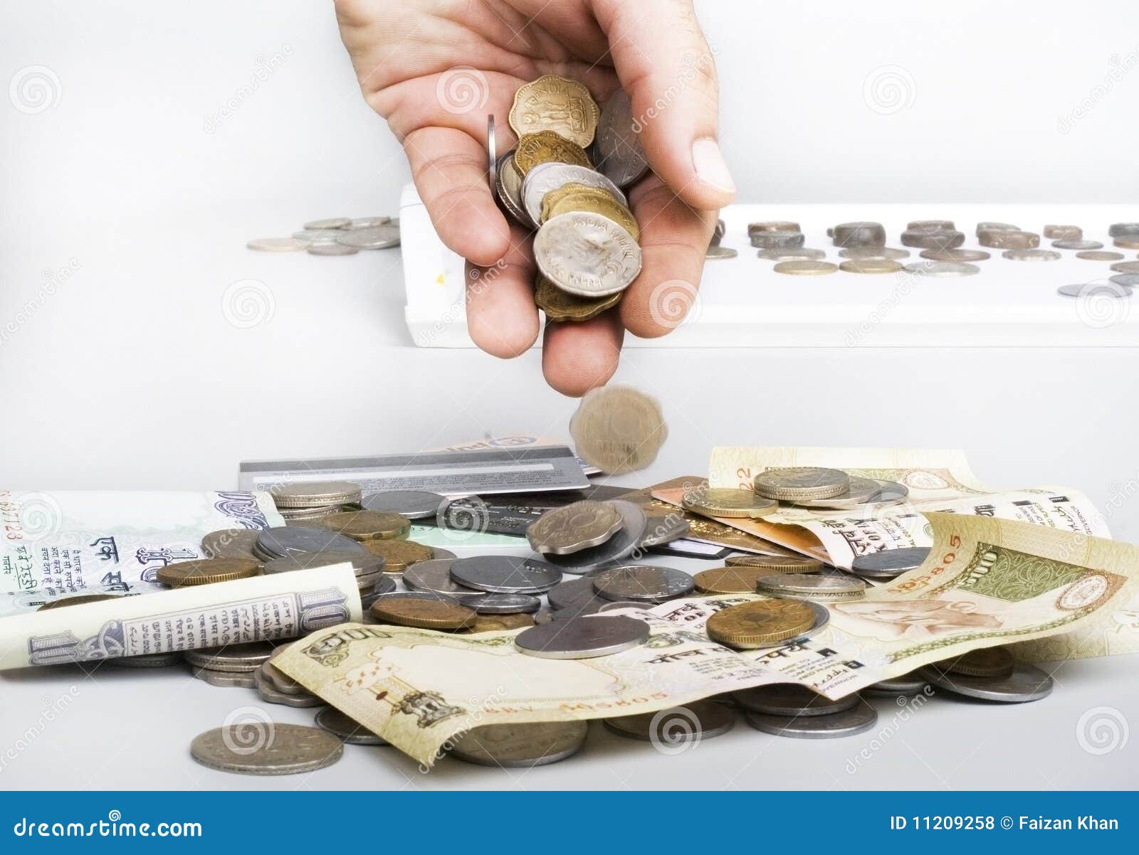 Stack Of Indian 10 Rupee Currency Note Rolls On The Chart Paper Royalty ...