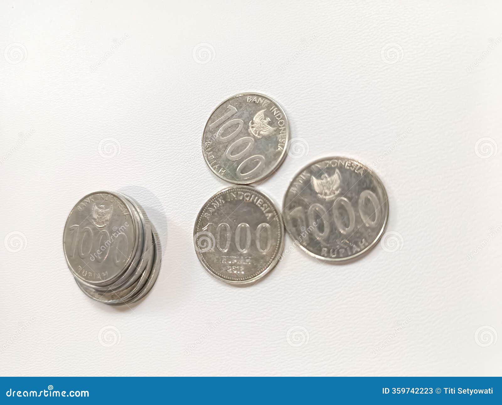A Stack of Indonesian Rupiah Coins on a White Background, Highlighting ...