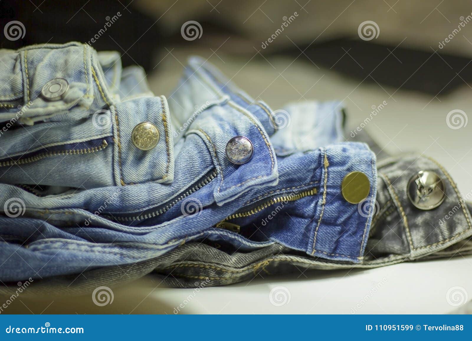 A Stack of Jeans of Different Shades Lying on Each Other Stock Image ...