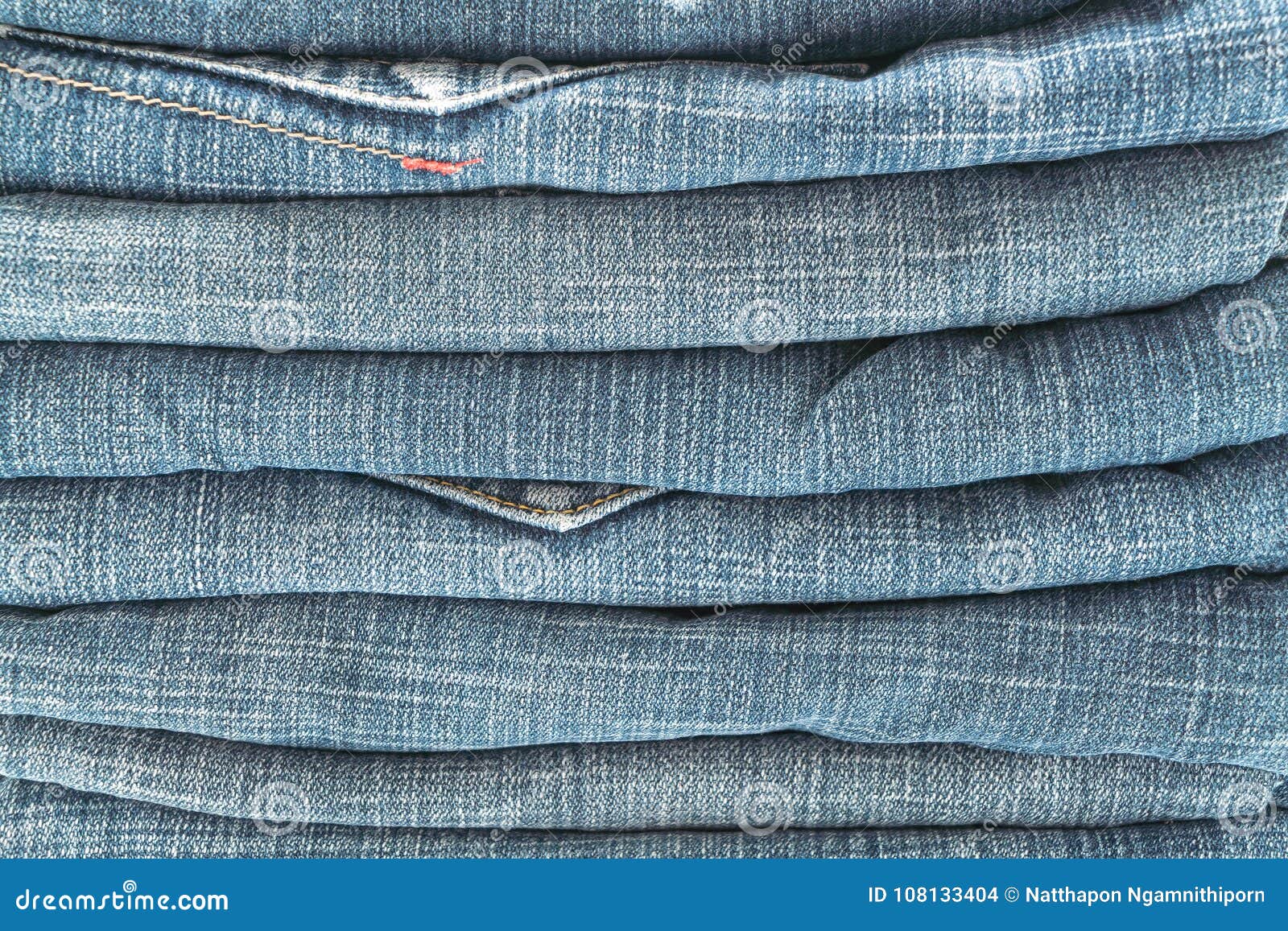 Stack of Jeans Folded on White Background Stock Photo - Image of detail ...