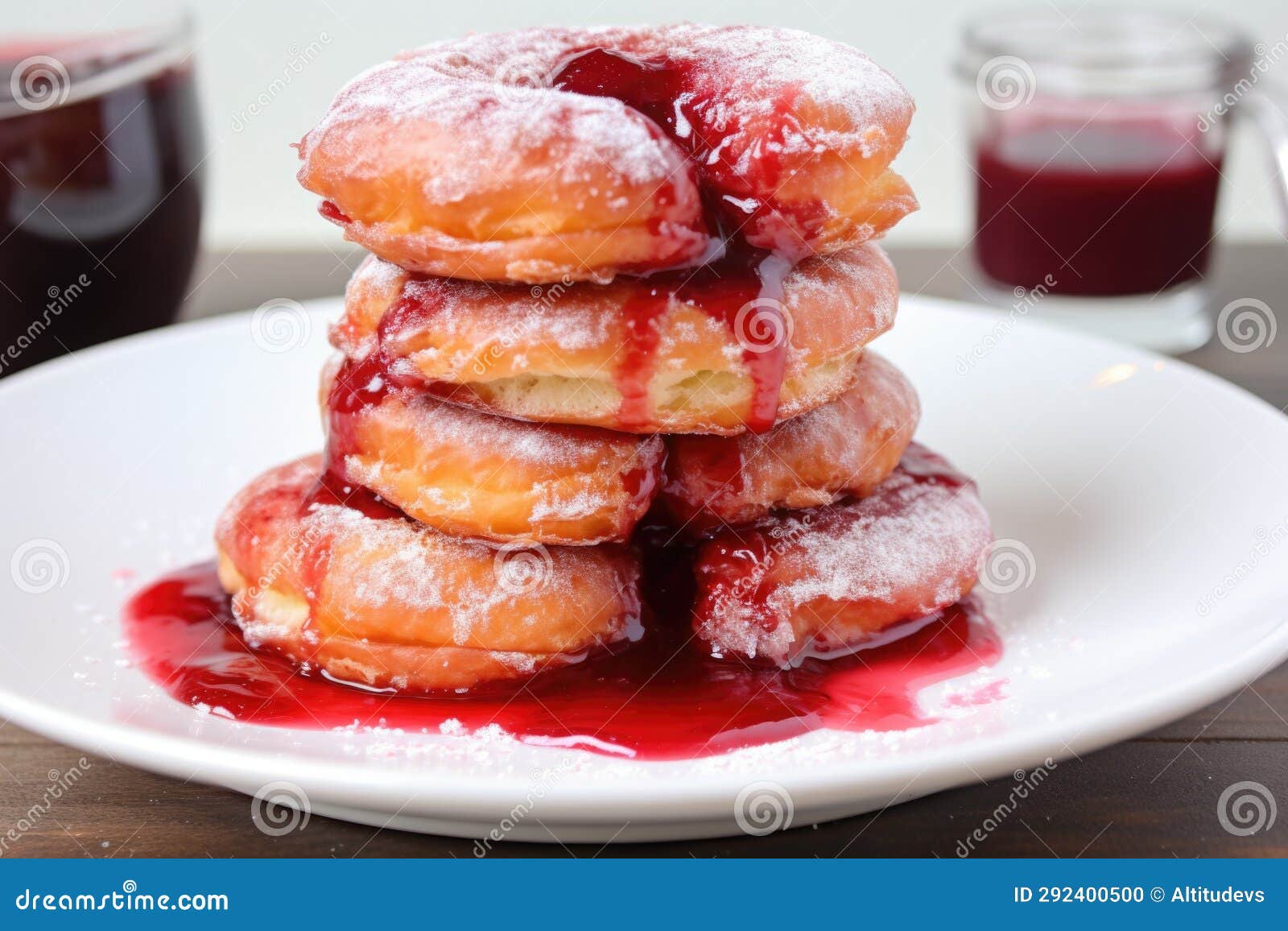 Stack of Jelly-filled Donuts on a White Plate Stock Photo - Image of ...