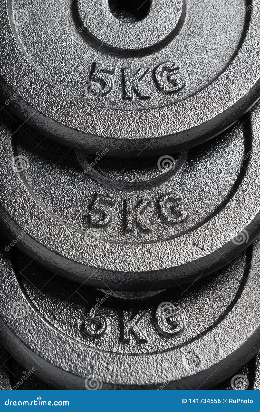 Stack Of Gym Weight Plates With A Tape Measure Royalty-Free Stock Photo ...