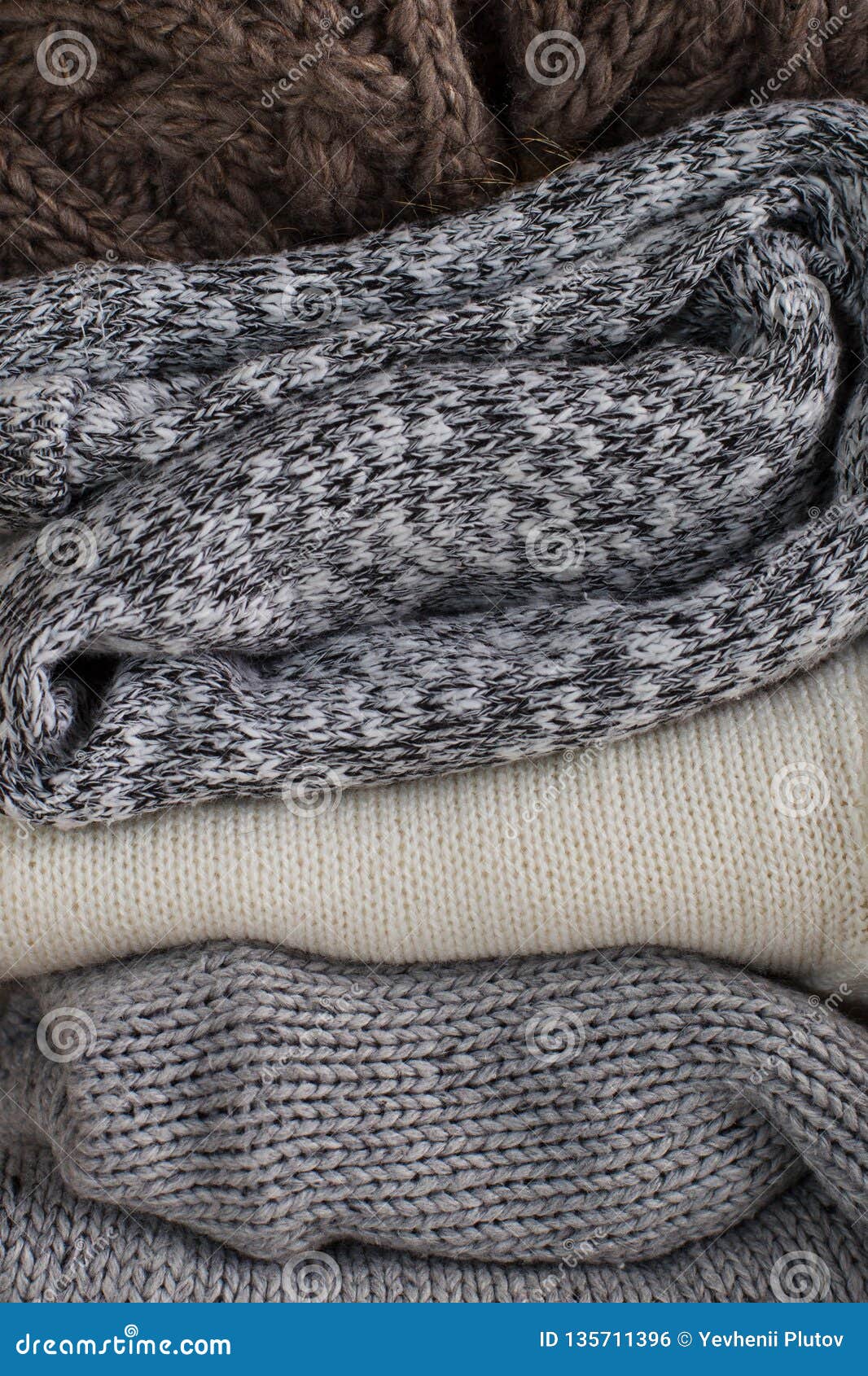 A Stack of Knitted Clothes of Different Colors and Textures Stock Photo ...