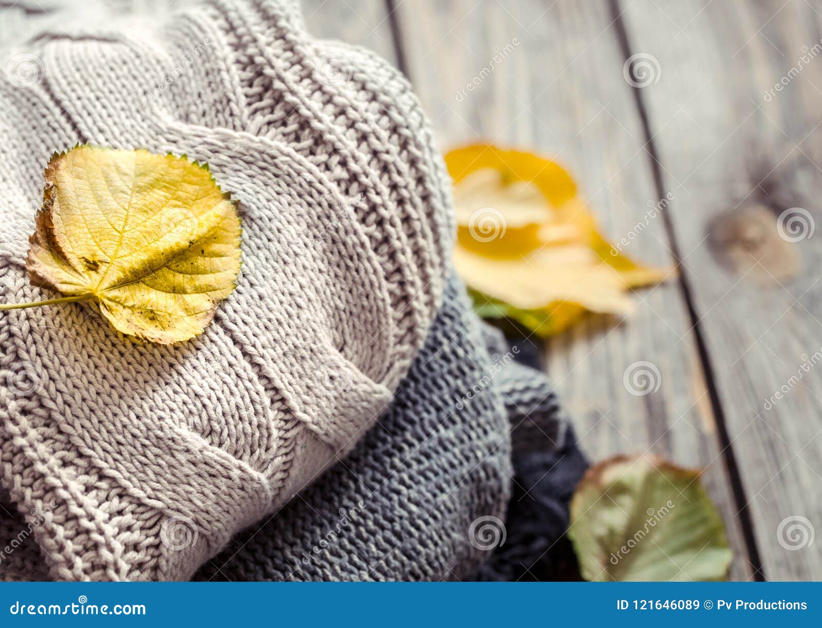 A Stack of Sweaters and Autumn Leaves Stock Image - Image of knit ...