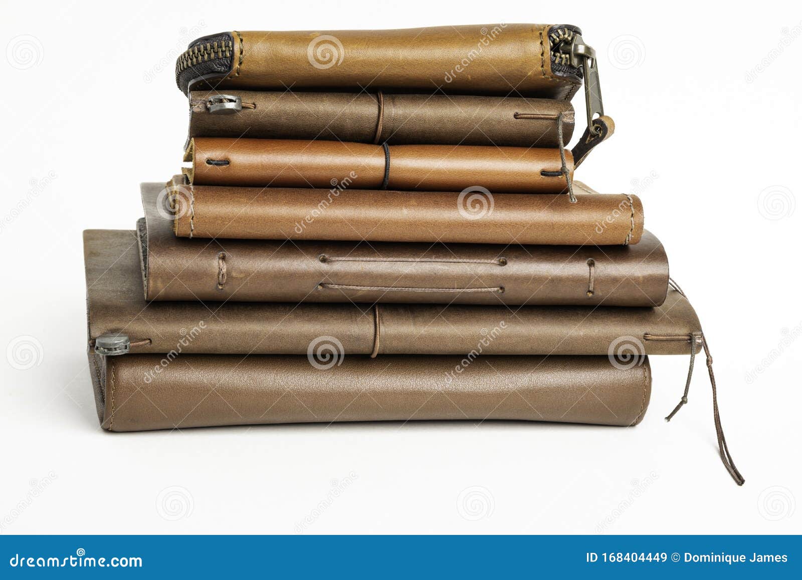 A Stack of Leather-Bound Journals, Notebooks, Wallets & Cases Stock ...