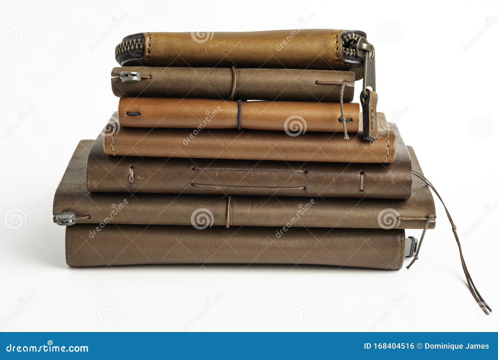 A Stack of Leather-Bound Journals, Notebooks, Wallets & Cases Stock ...
