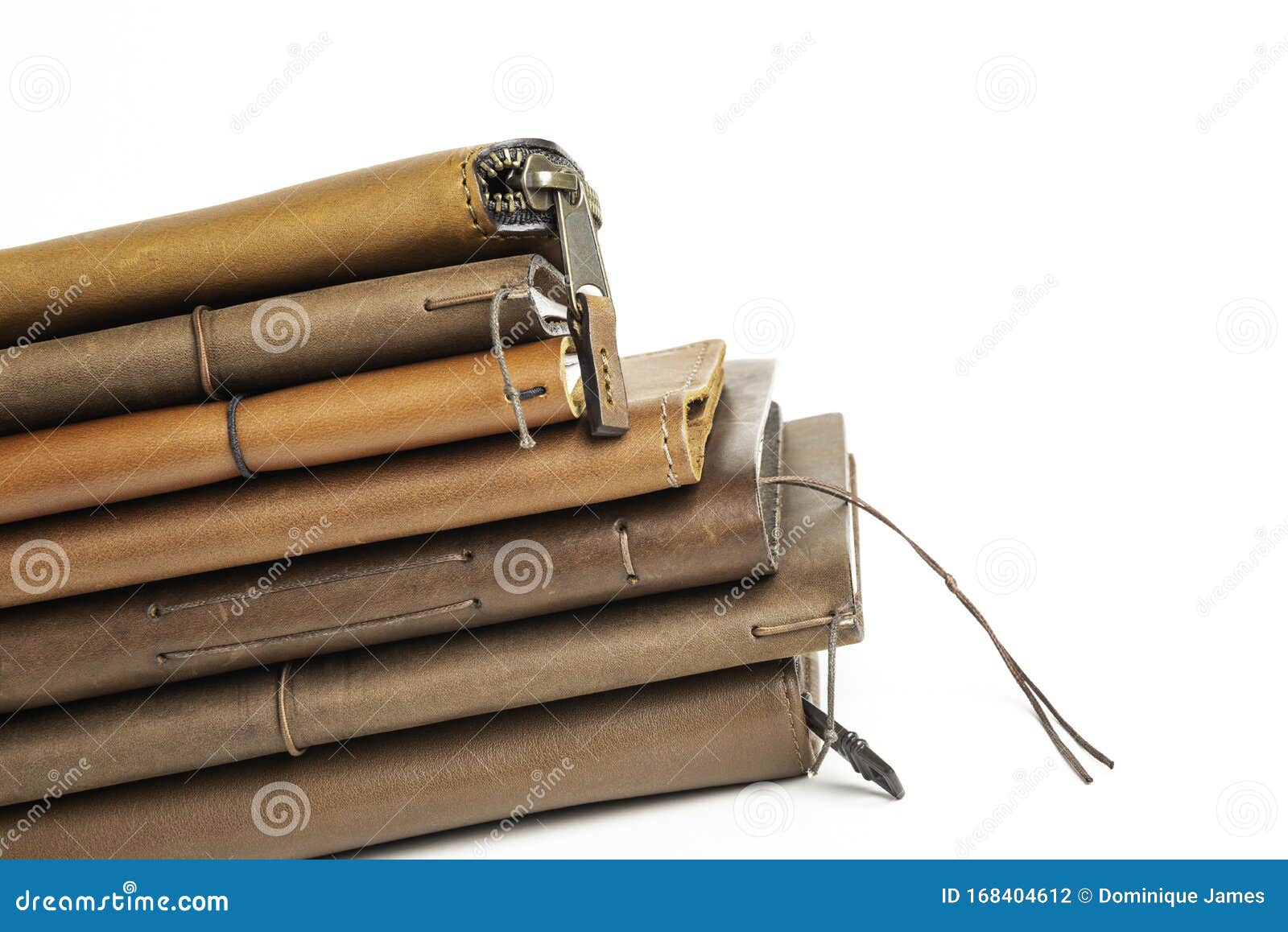 A Stack of Leather-Bound Journals, Notebooks, Wallets & Cases Stock ...