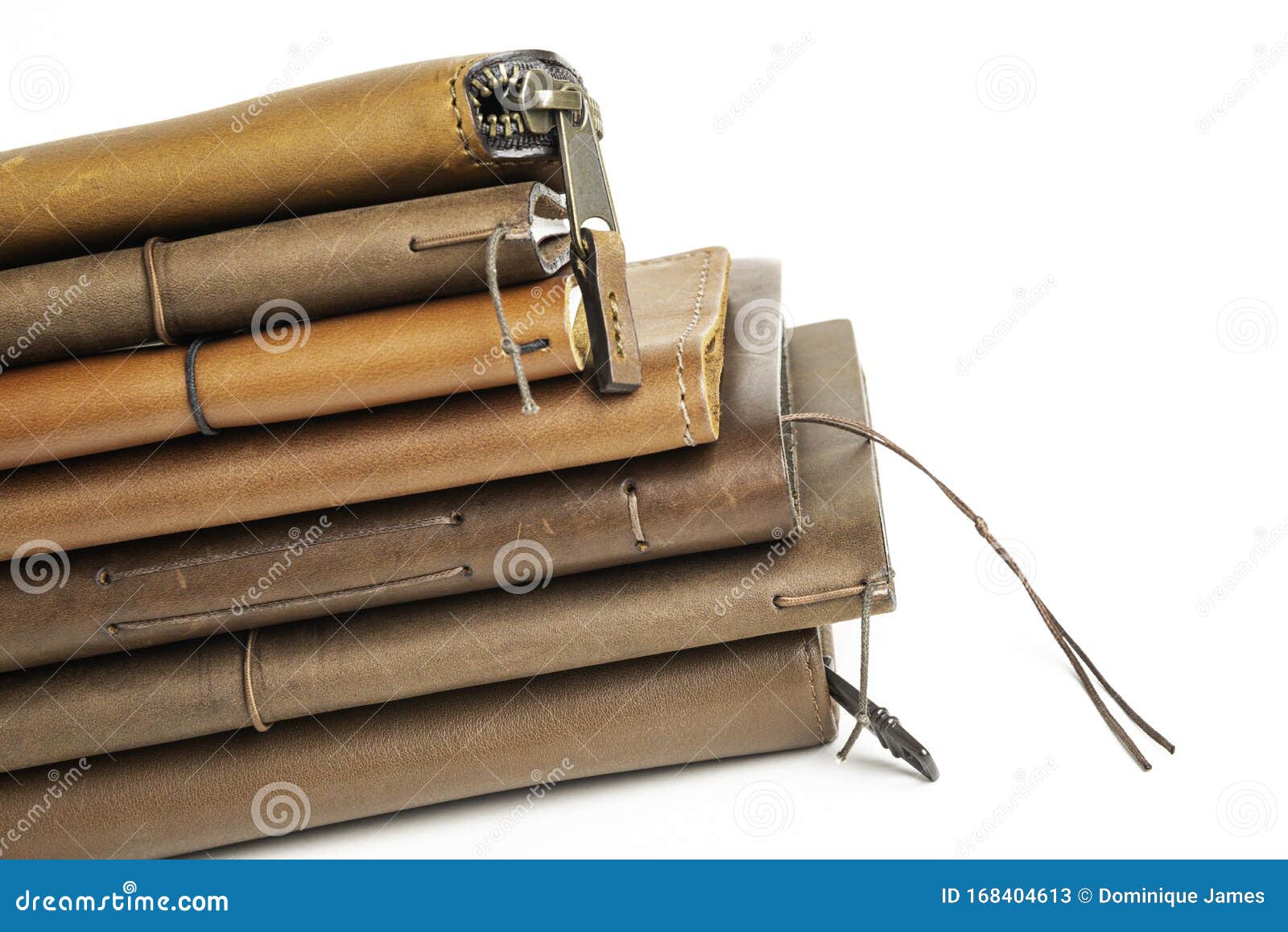 A Stack of Leather-Bound Journals, Notebooks, Wallets & Cases Stock ...