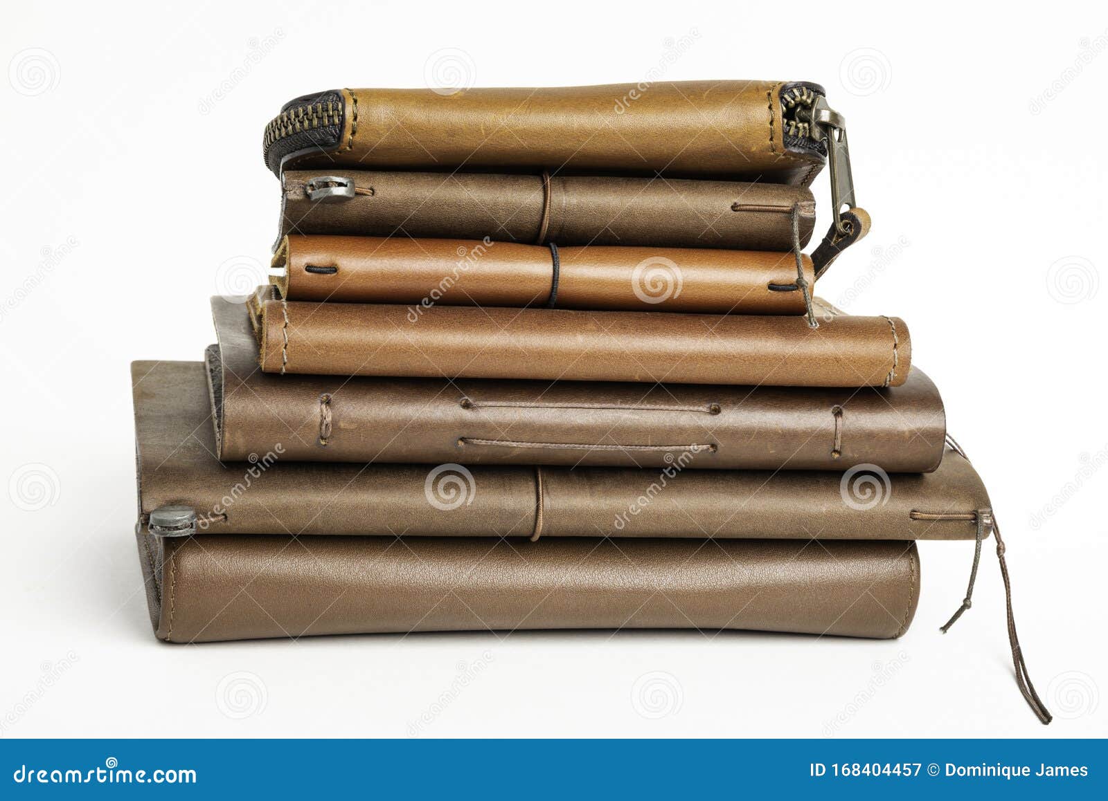 A Stack of Leather-Bound Journals, Notebooks, Wallets & Cases Stock ...