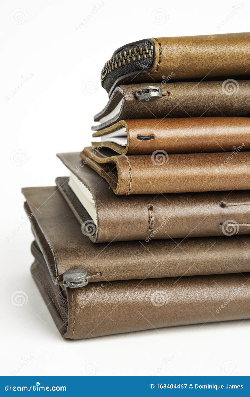 A Stack of Leather-Bound Journals, Notebooks, Wallets & Cases Stock ...