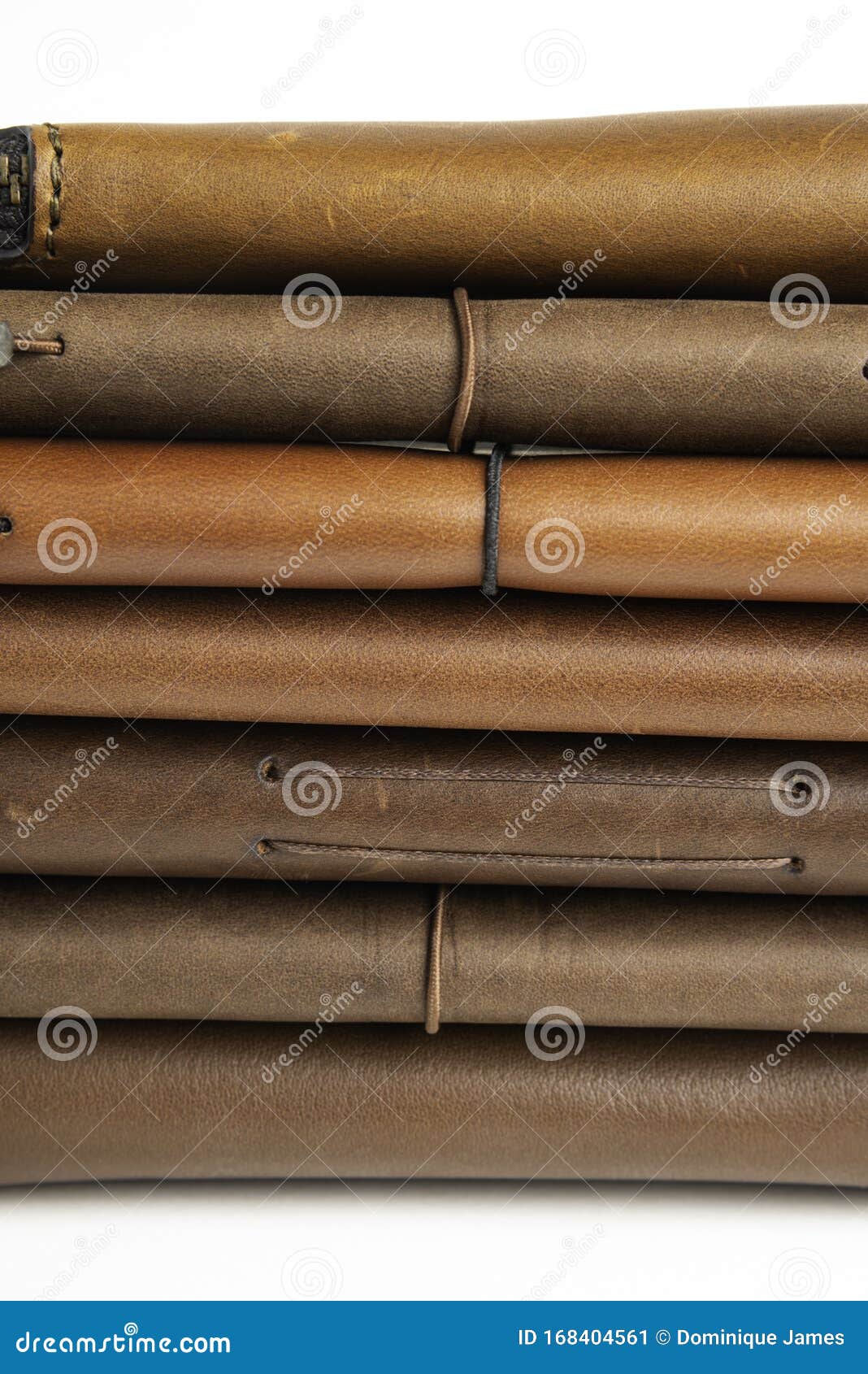 A Stack of Leather-Bound Journals, Notebooks, Wallets & Cases Stock ...