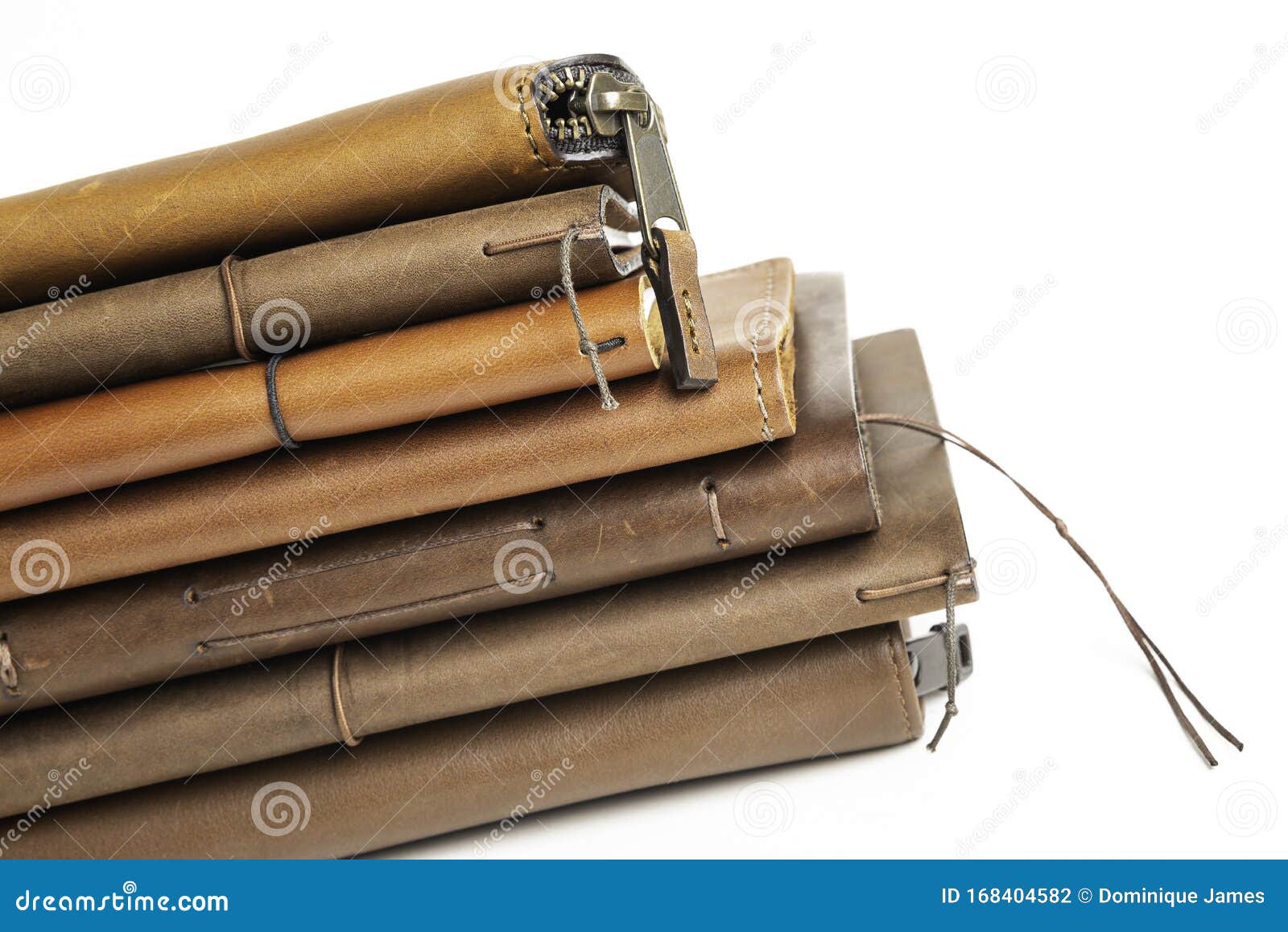 A Stack of Leather-Bound Journals, Notebooks, Wallets & Cases Stock ...