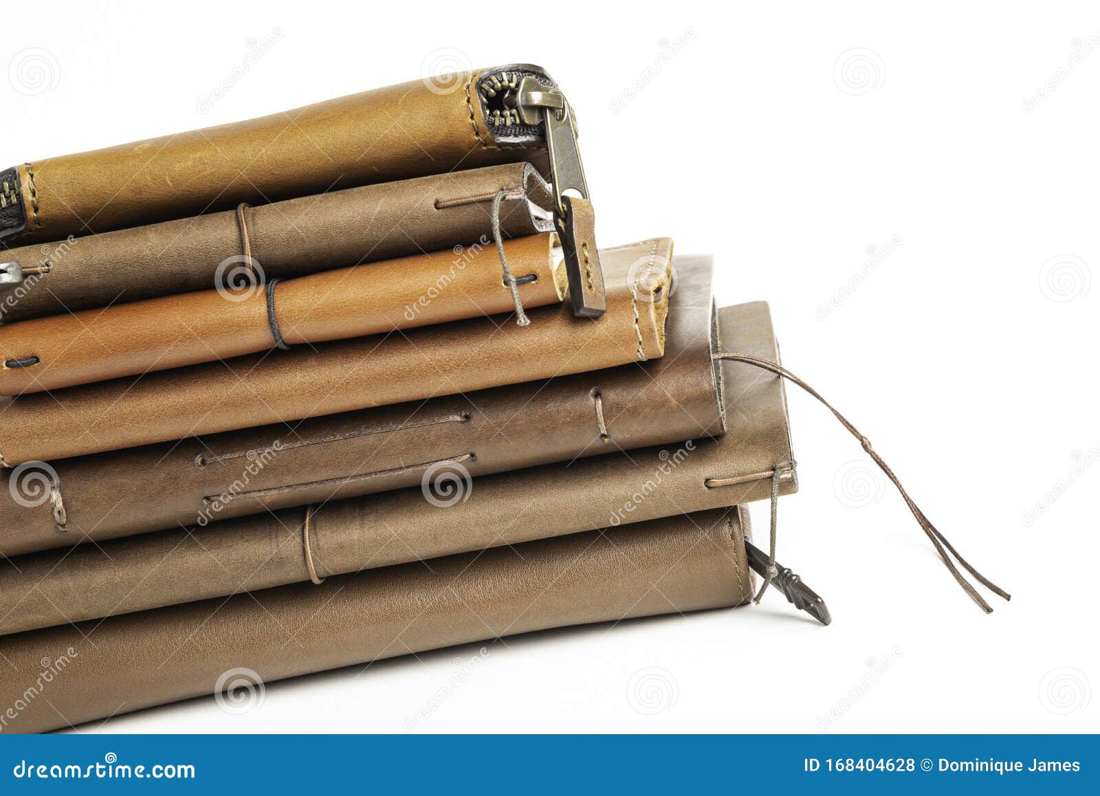 A Stack of Leather-Bound Journals, Notebooks, Wallets & Cases Stock ...