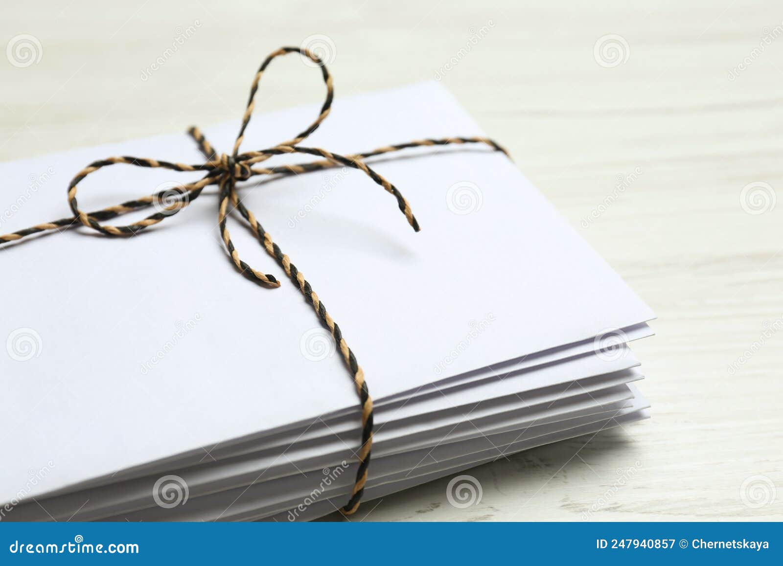 Stack of Letters Tied with String on White Wooden Table, Closeup Stock ...