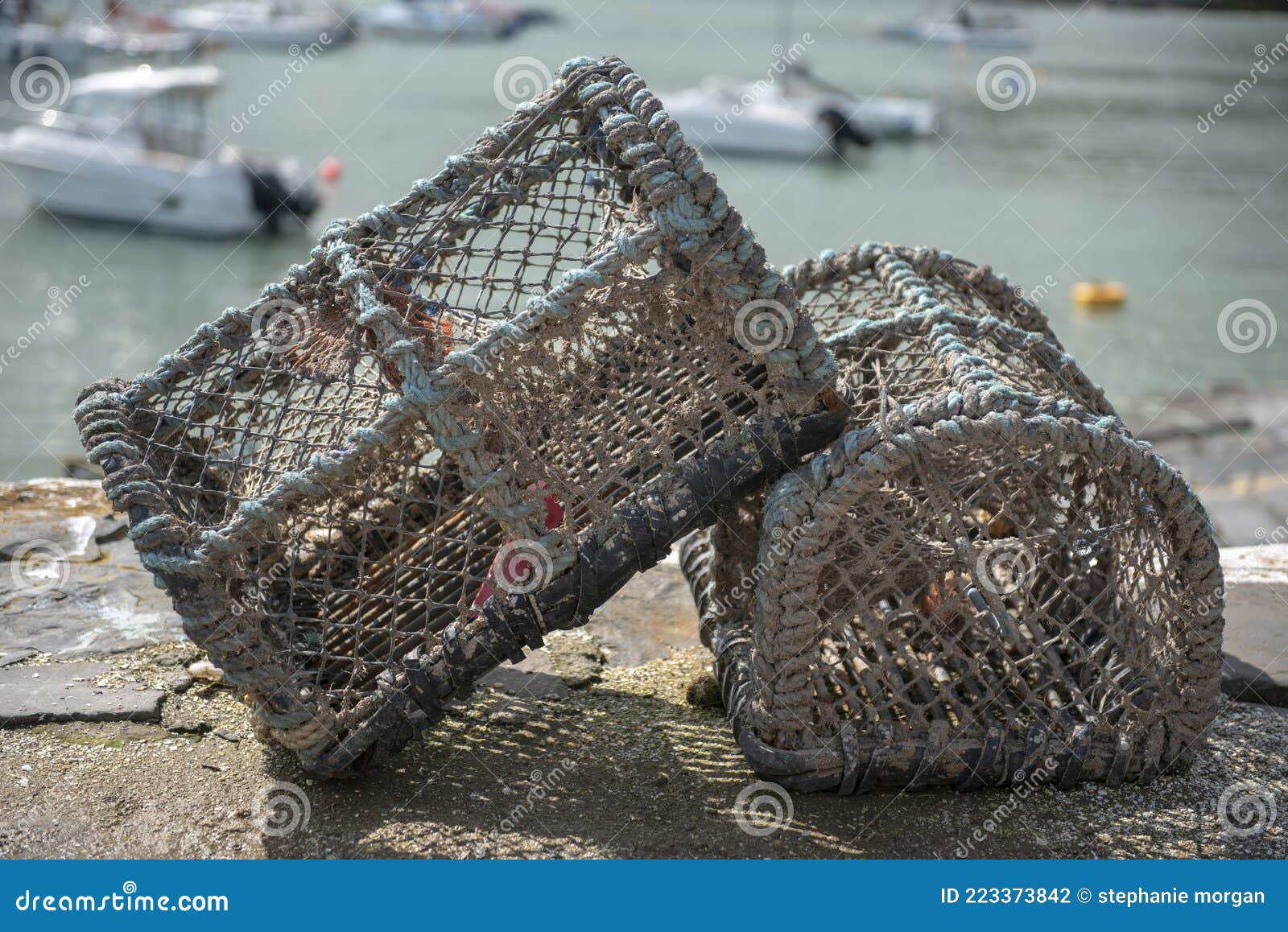 Stack of Lobster Pots by the Sea Stock Photo - Image of container ...