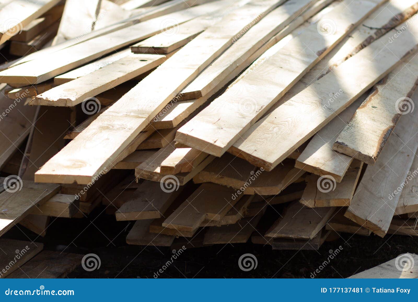 Stack of Long and Thin Wooden Planks Outside Stock Image - Image of ...