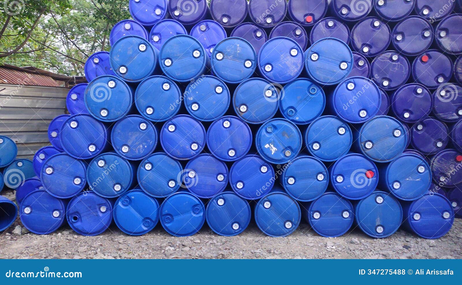 Stack of 20lt Plastic Drums in Dark Blue and Light Blue is Very Neat ...