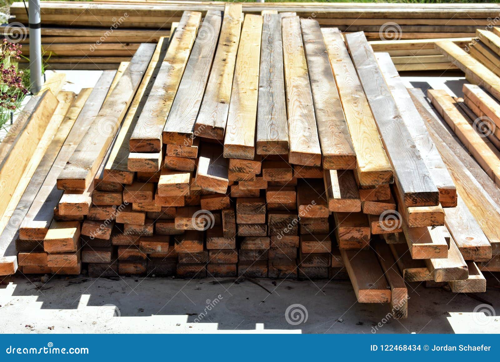 Stack of Lumber stock photo. Image of sunlight, building - 122468434