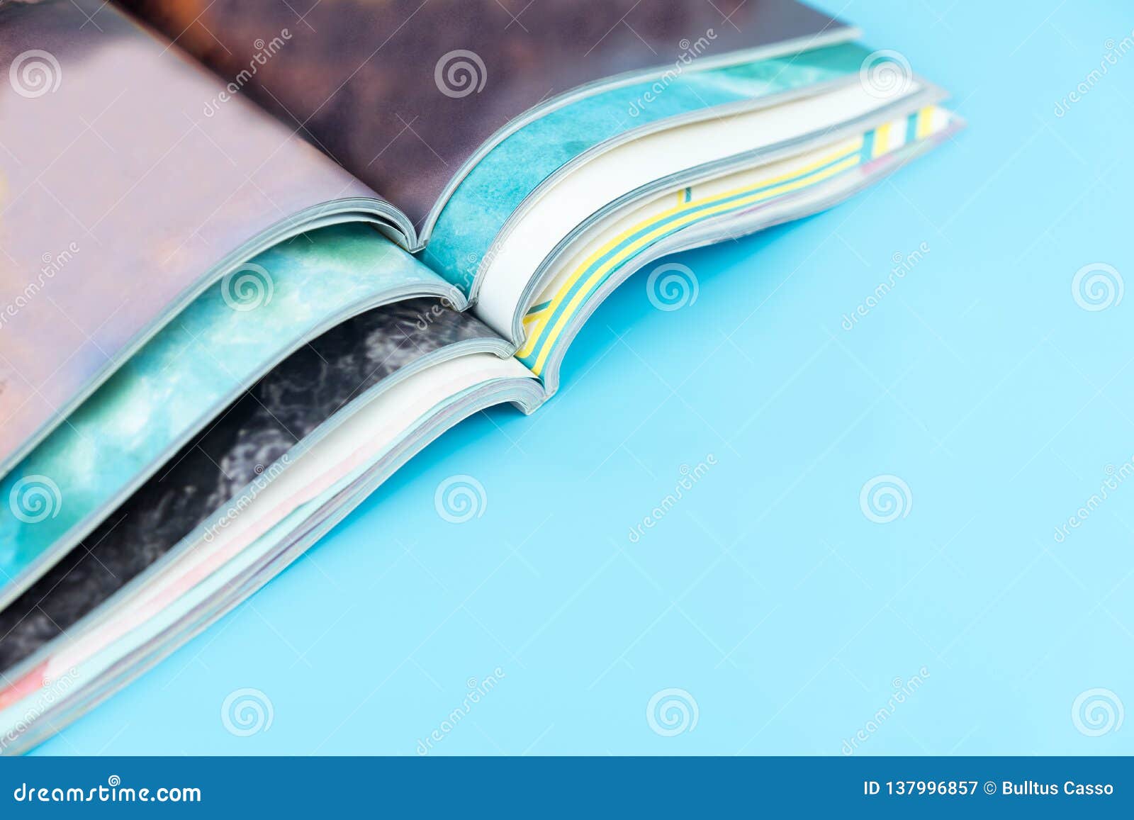 Stack Magazines on Blue Background Stock Image - Image of communication ...