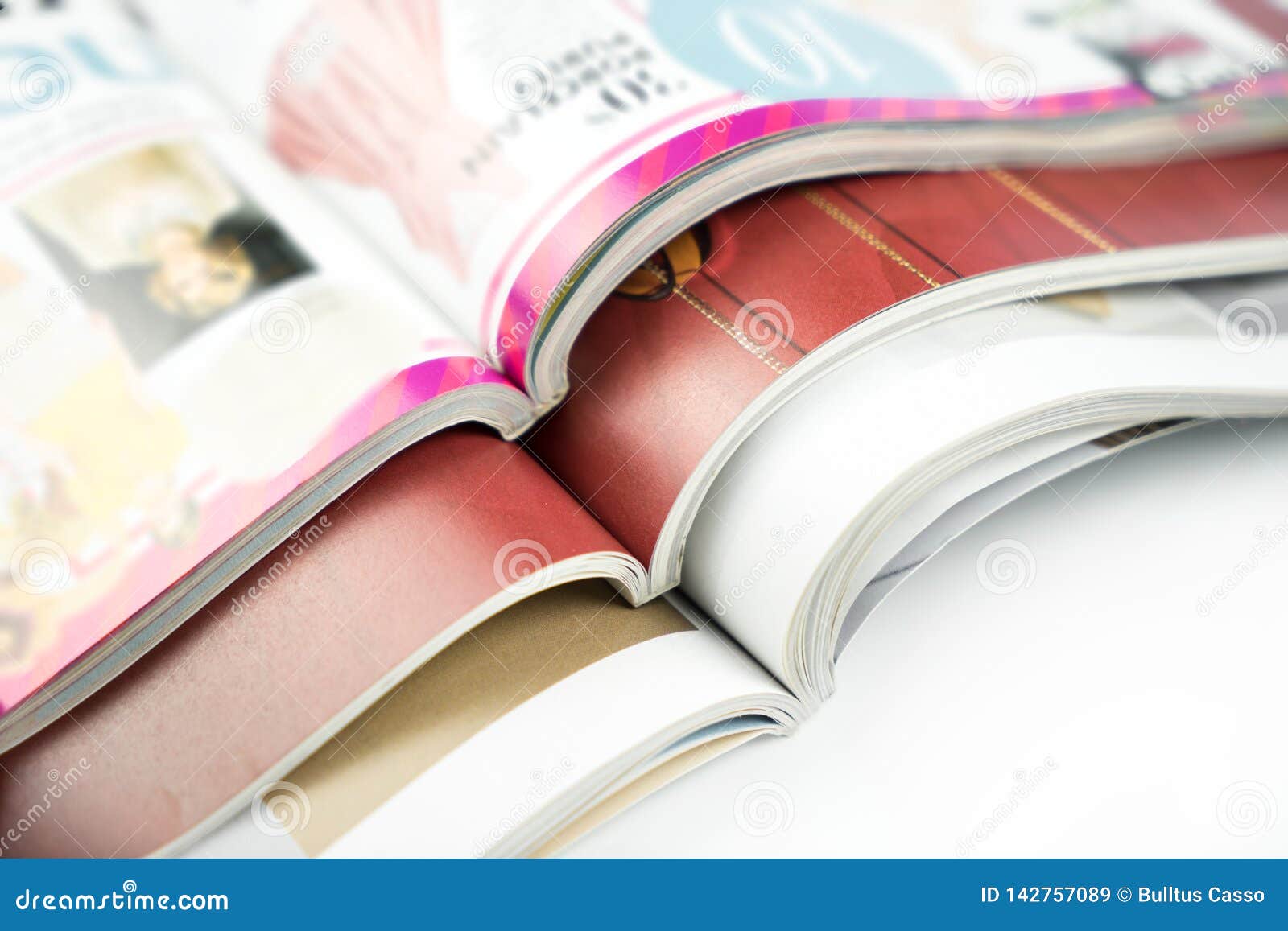 Stack Of Magazines And Newspaper Open Page On Table Royalty-Free Stock ...