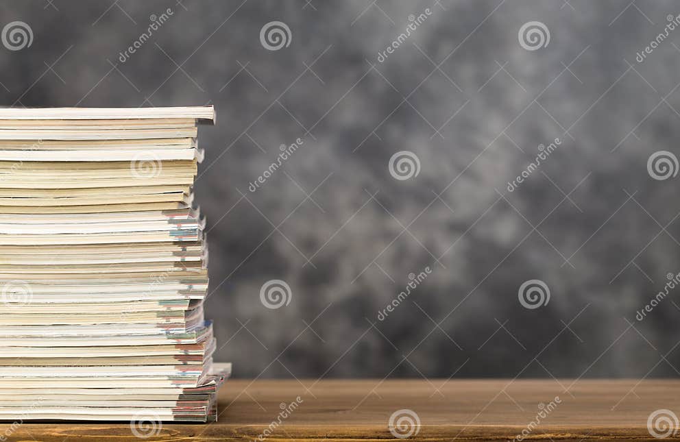 Stack of Magazines on Left Side of Table Stock Image - Image of journal ...