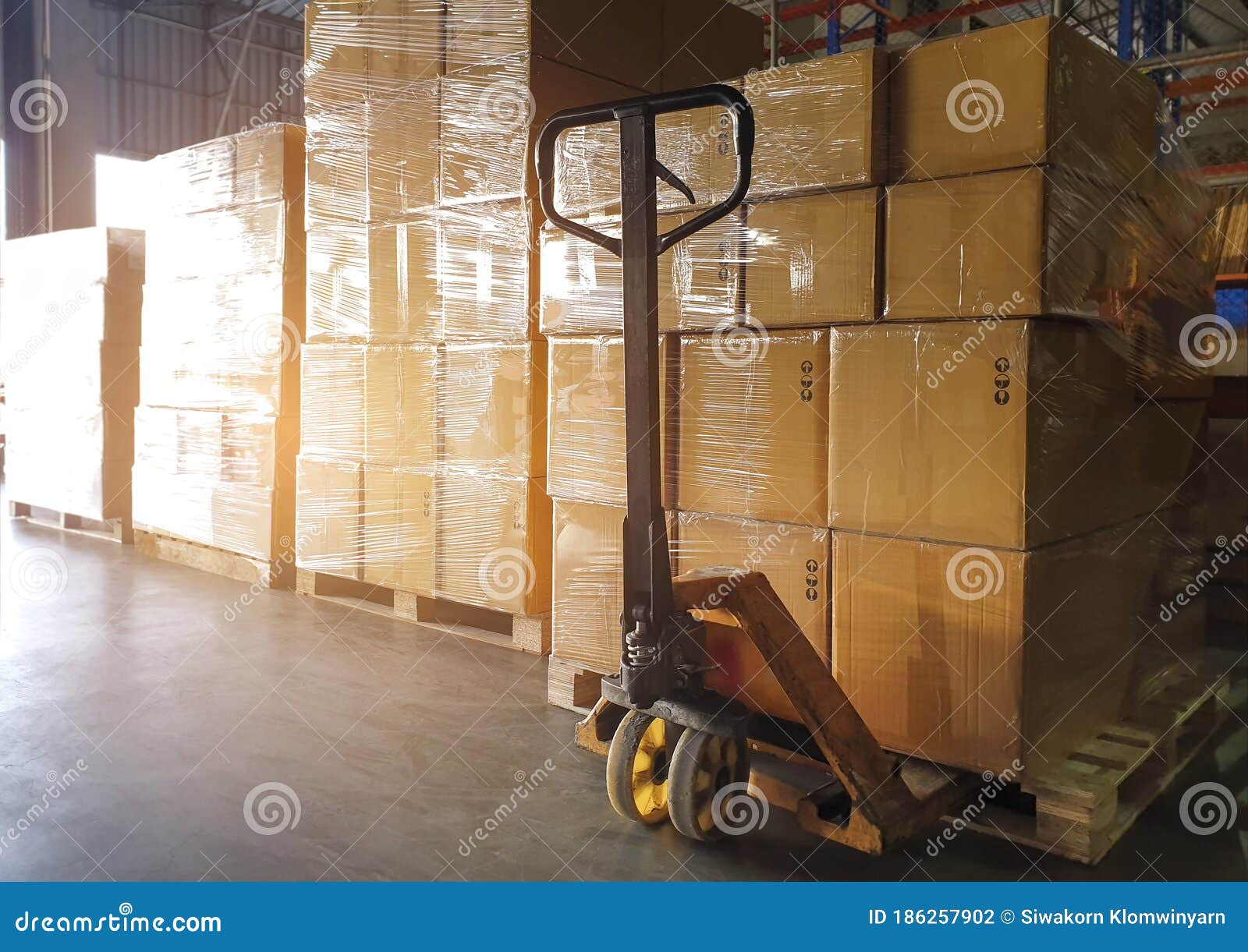 Stack Of Shipments Boxes On Wooden Pallets. Interior Of Warehouse ...