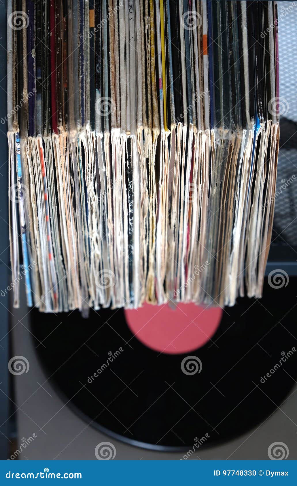 Stack of Many Vinyl Records in Old Covers and Turntable in Gray Case ...