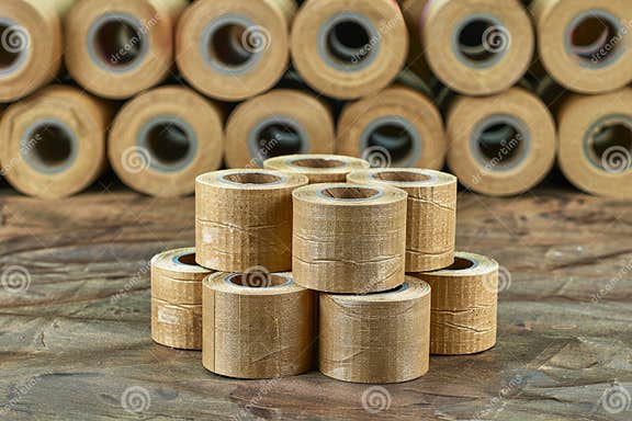 Stack of Masking Tape Rolls Arranging on Table , Focus in the Front and ...