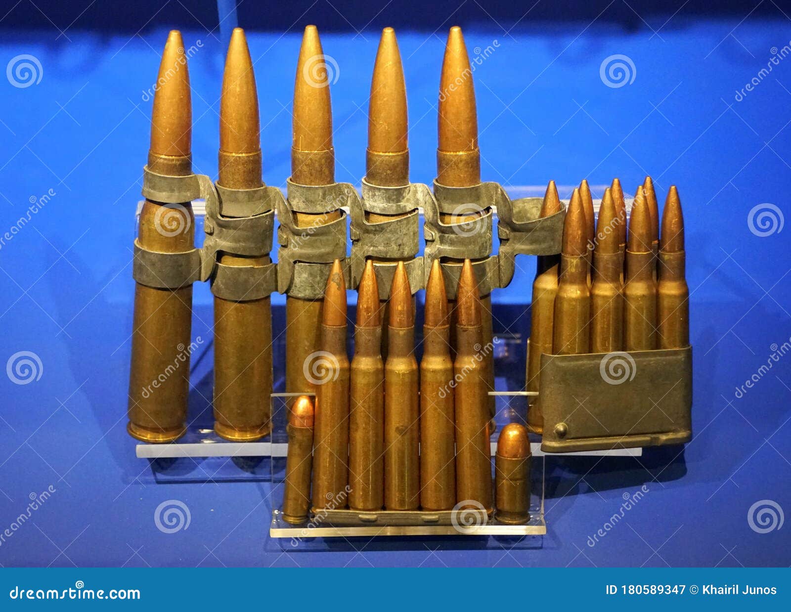 Bullets And Shell Bullets On White Background. A Group Of 9mm Bullets ...