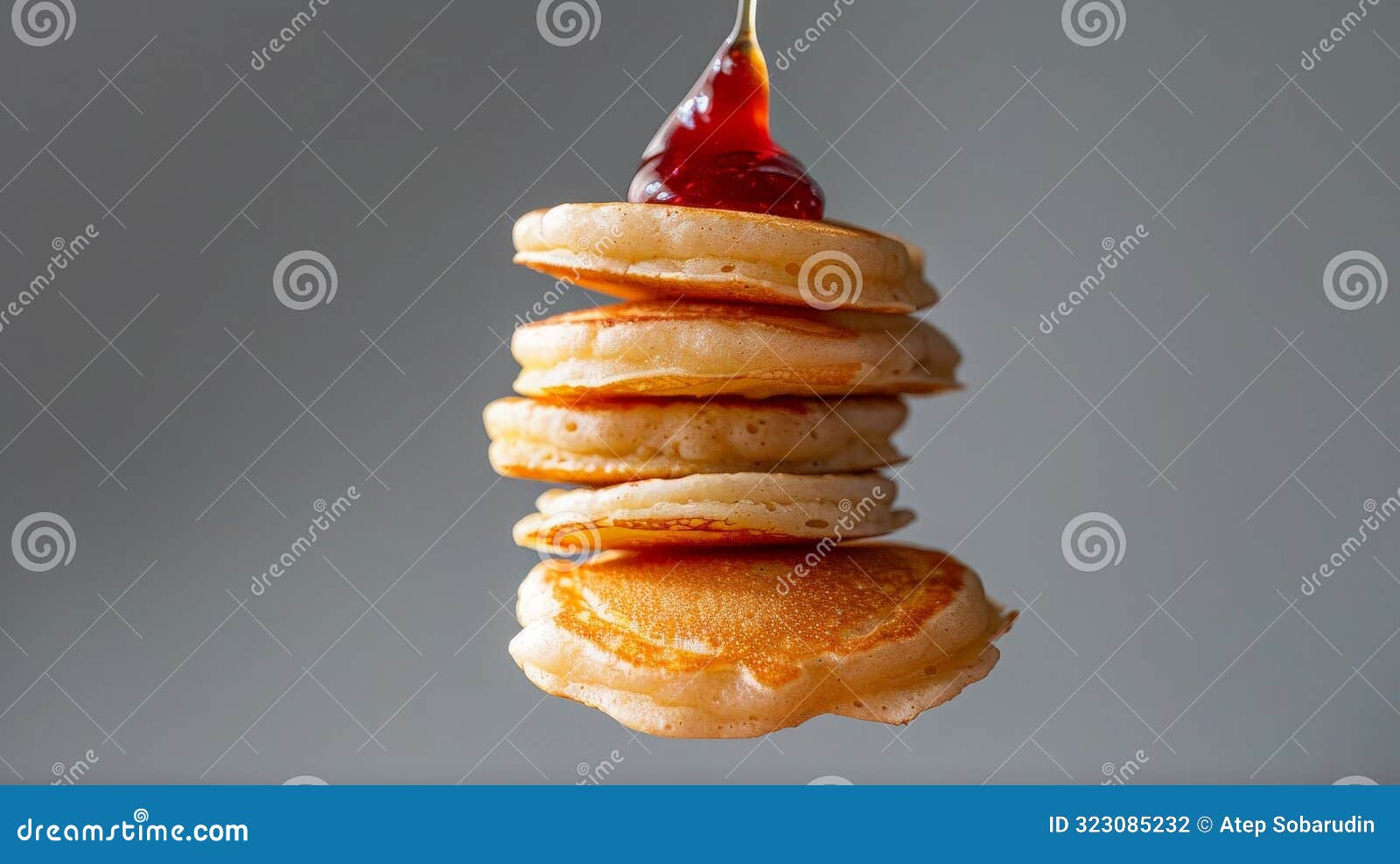 Stack of Mini Pancakes Drizzled with Syrup Stock Photo - Image of light ...