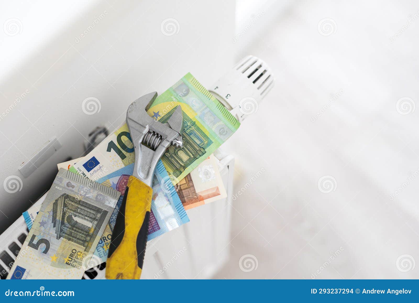 A Stack of Money on the Background of the Radiator. Expensive Utilities ...