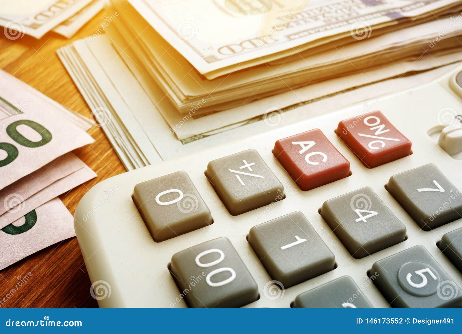 Stack of Money and Calculator. Budgeting and Savings. Dollar Banknotes ...