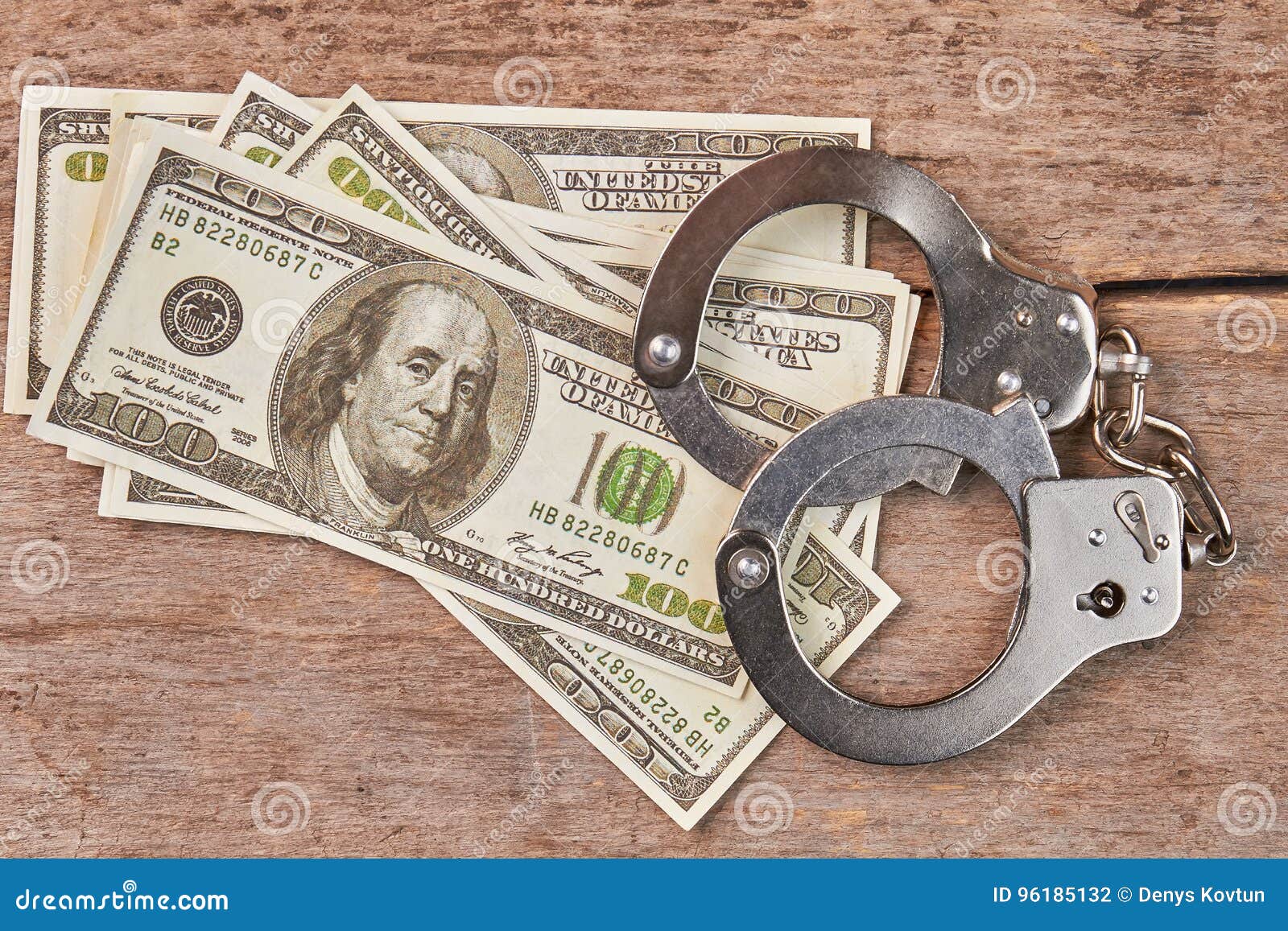 Stack of Money and Handcuffs on Table. Stock Photo - Image of concept ...