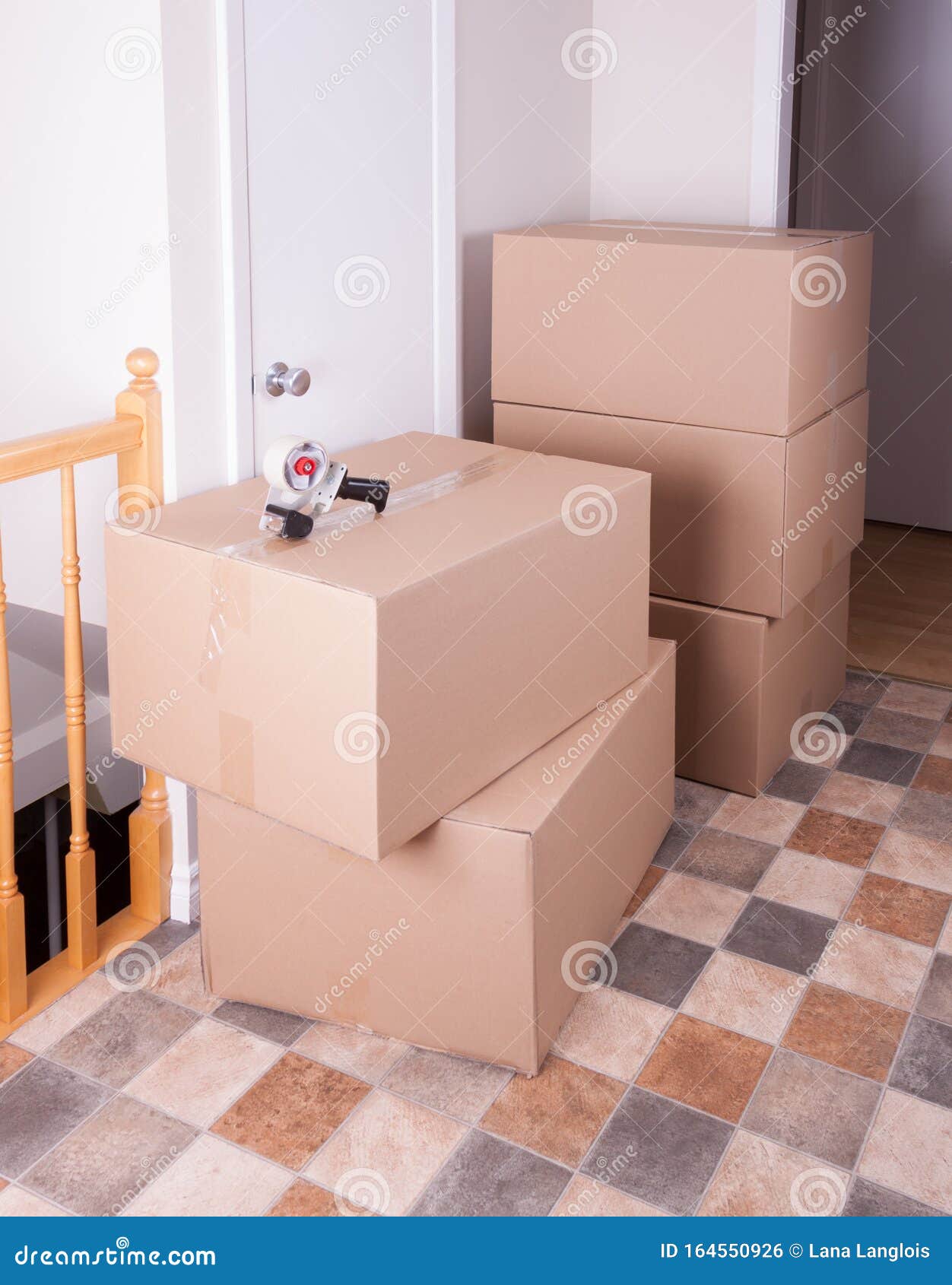 Stack of Moving Box in a House Stock Photo - Image of package ...