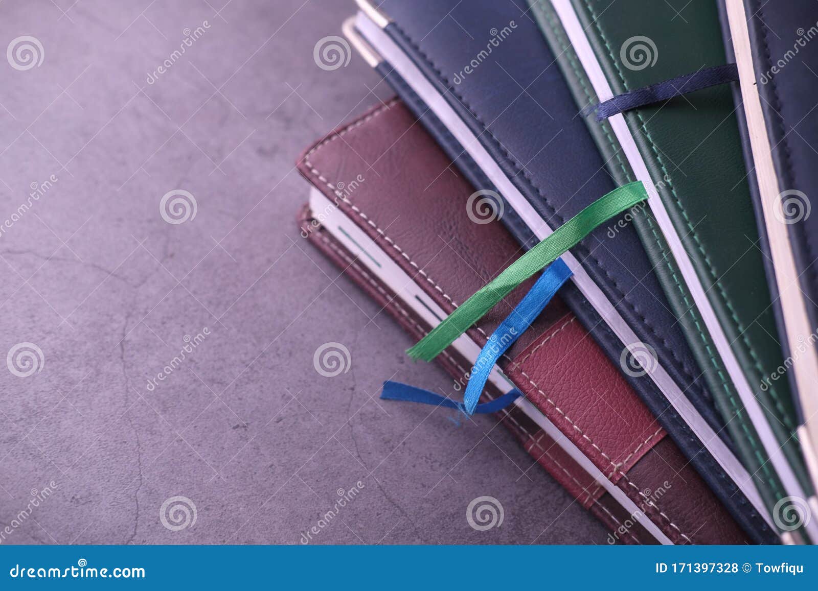 Stack of Multi Color Diary on Black Background Stock Photo - Image of ...