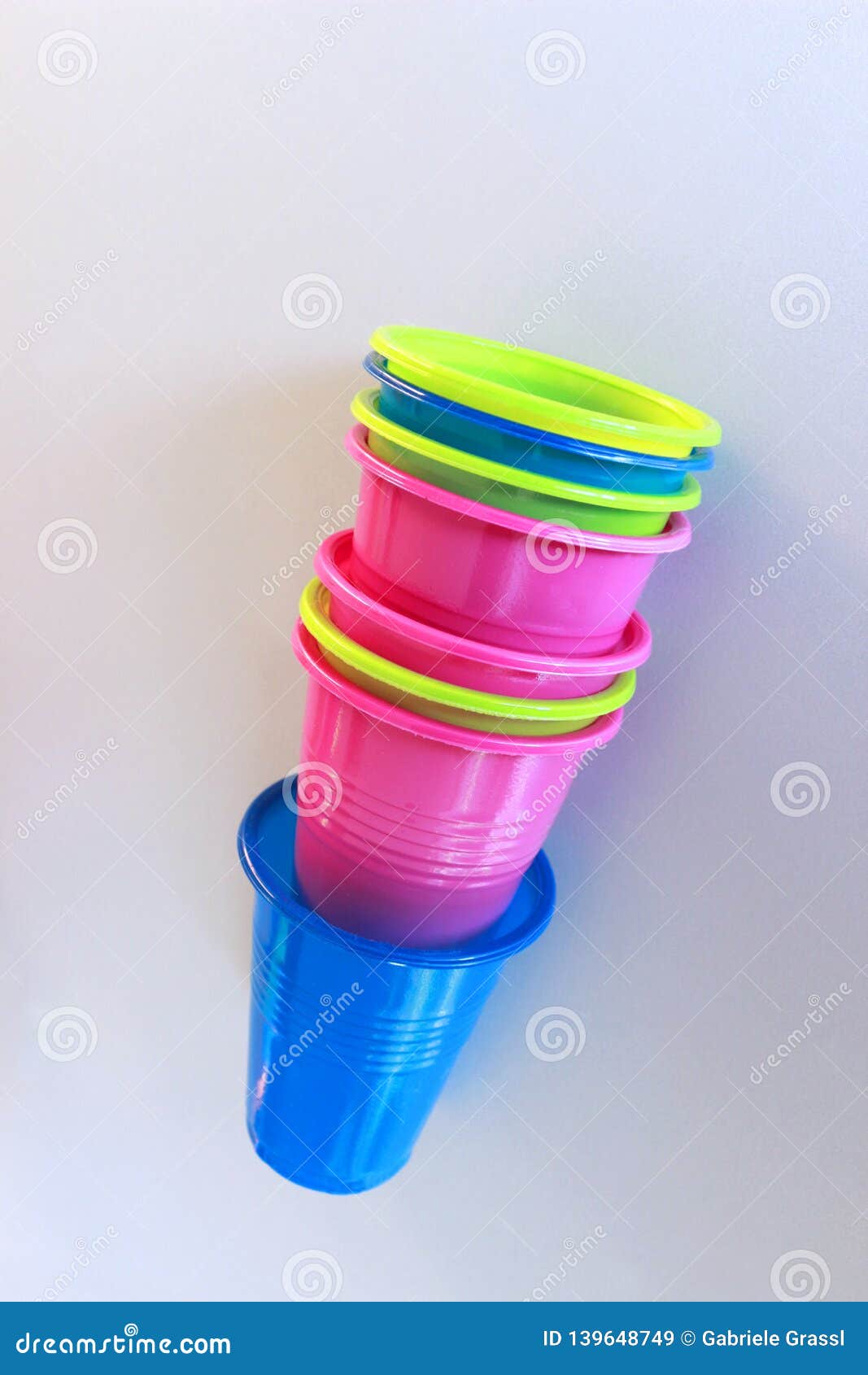 Stack of Colorful Plastic Cups Stock Image - Image of vibrant, space ...