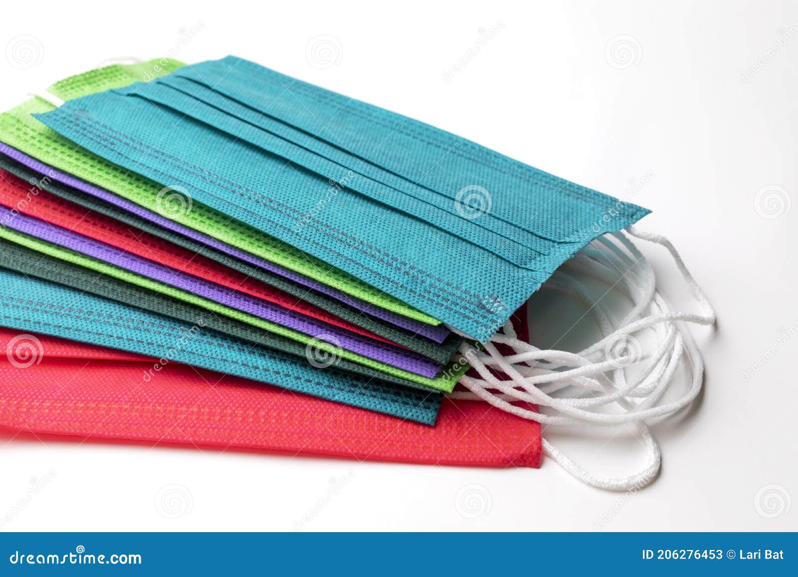 Stack of Multi-colored Protective Masks on White Background ...