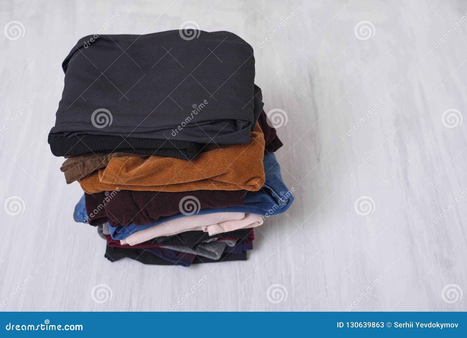 Stack of Multi-colored Stacked Things on a Wooden Background. Stock ...