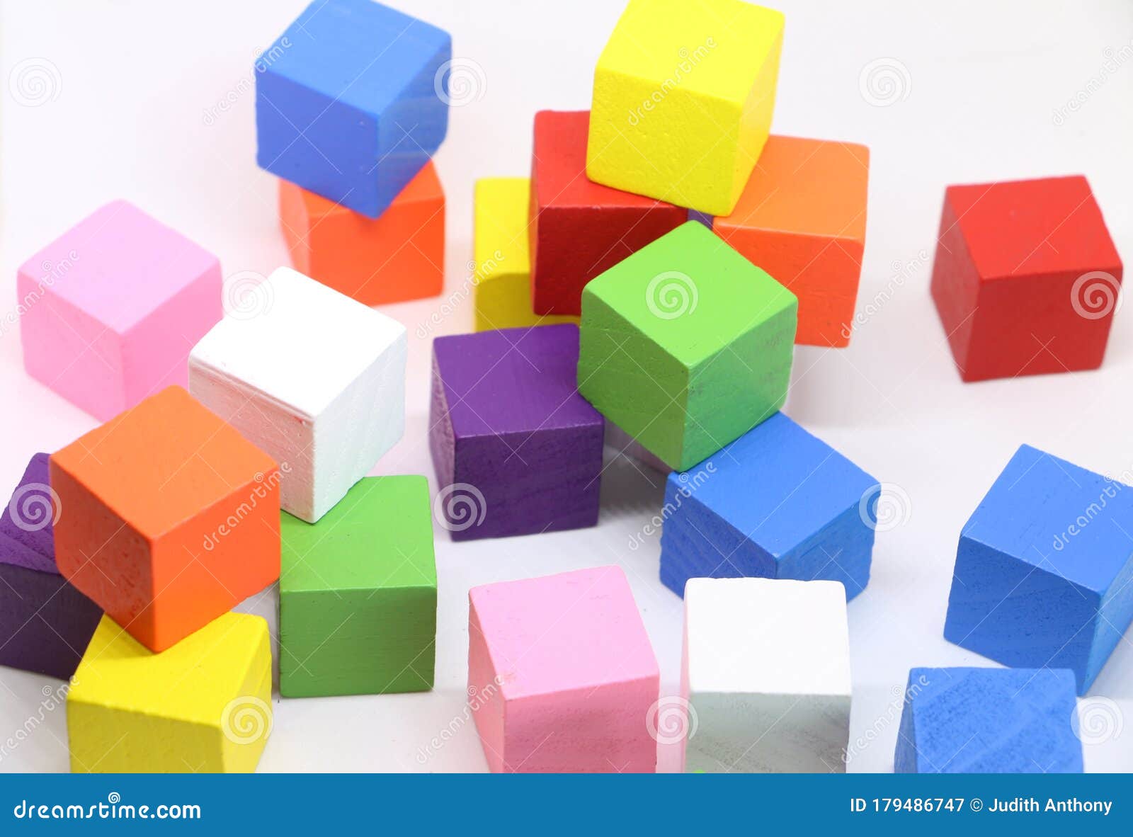 Stack of Multi Coloured Wooden Blocks Isolated on White Background ... Stack of Multi Coloured Wooden Blocks Isolated on White Background ...