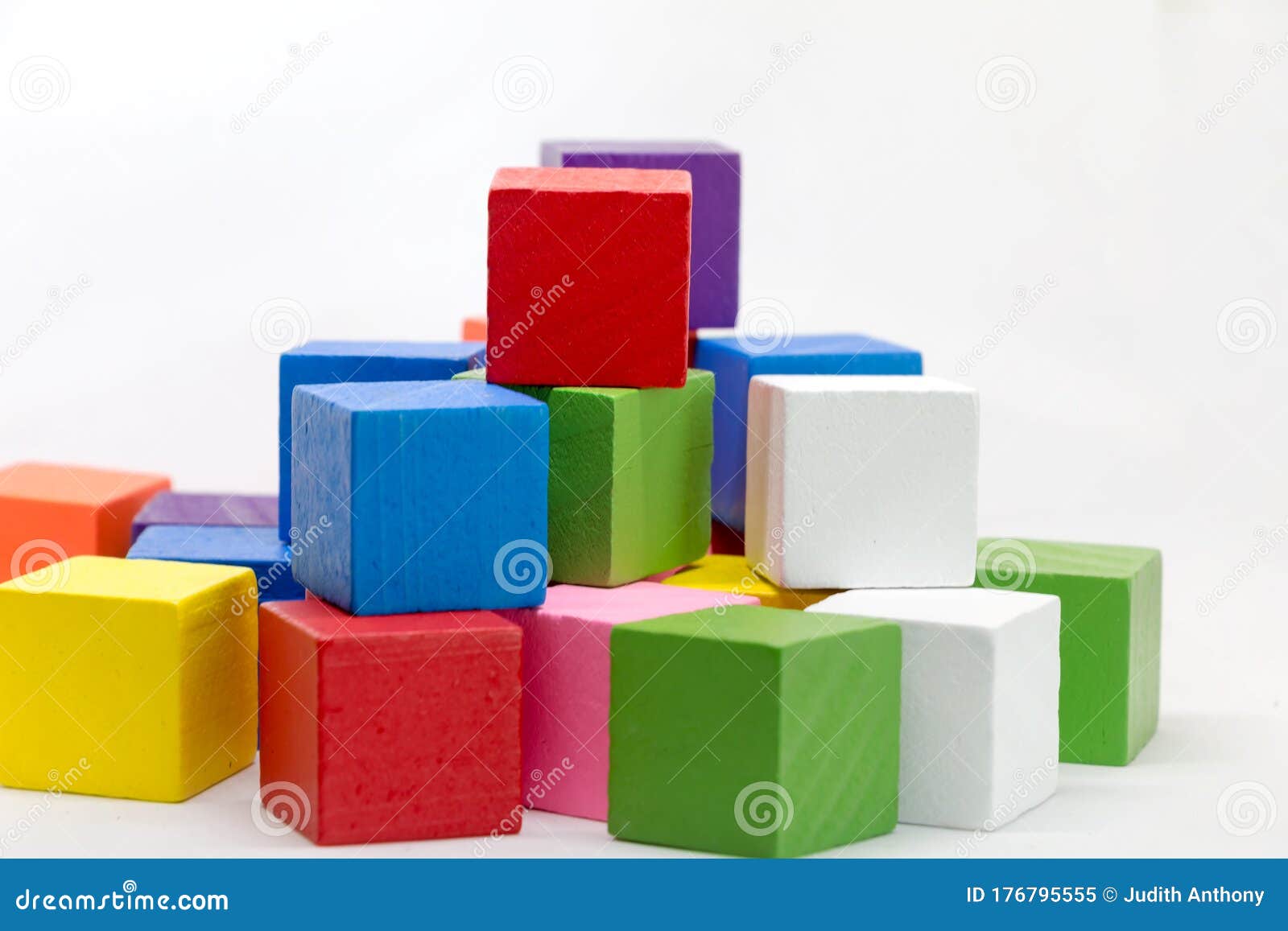 Stack of Multi Coloured Wooden Blocks on White Isolated Background ... Stack of Multi Coloured Wooden Blocks on White Isolated Background ...