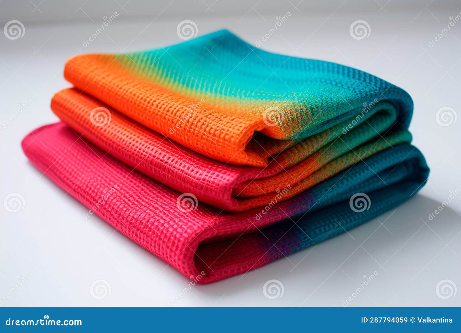 Stack of Multicolored Fabric Towels on White Background. Folded Rainbow ...